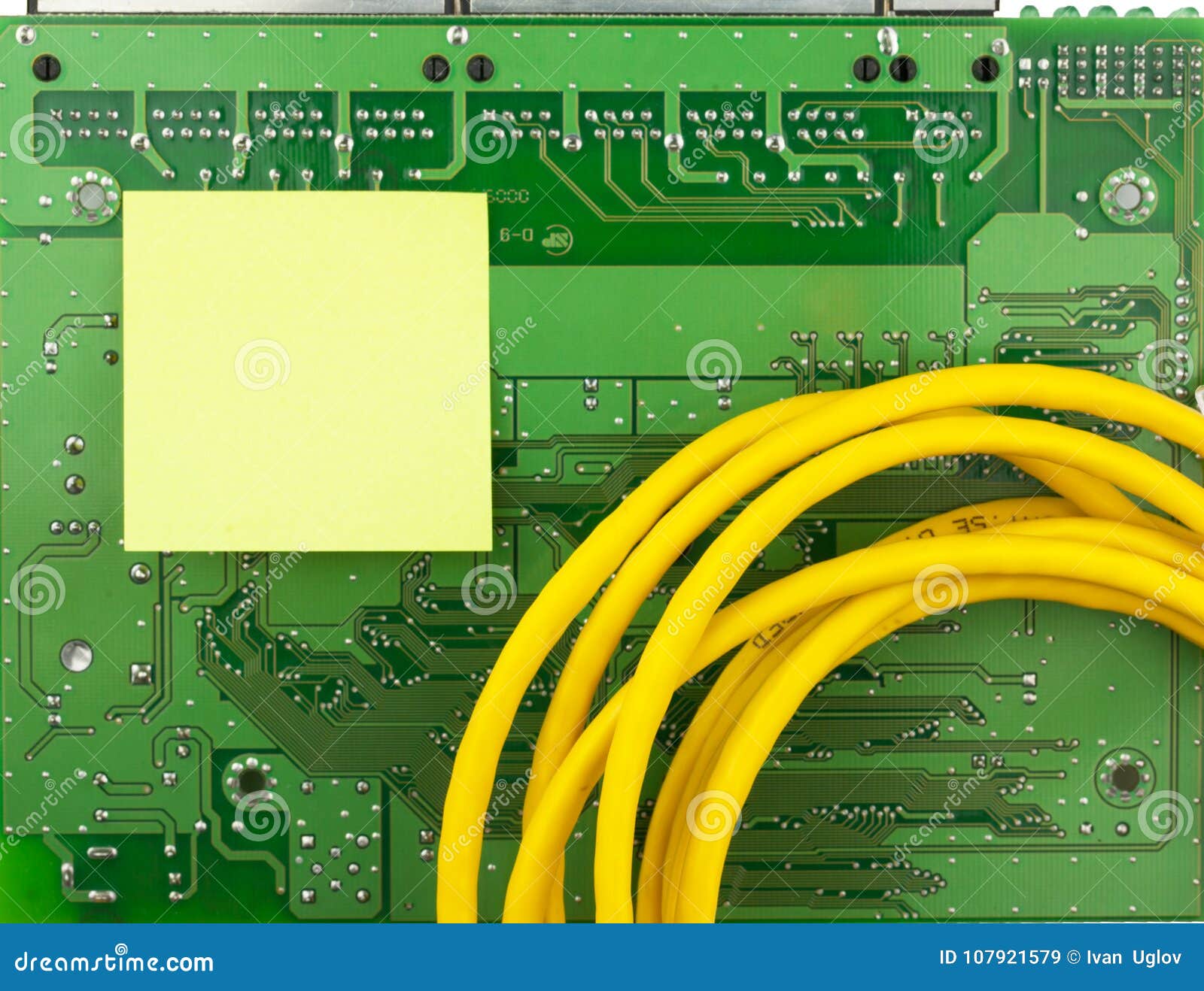 Closeup PCB Green Board, Sticker and Yellow Patch Cord Stock Image ...
