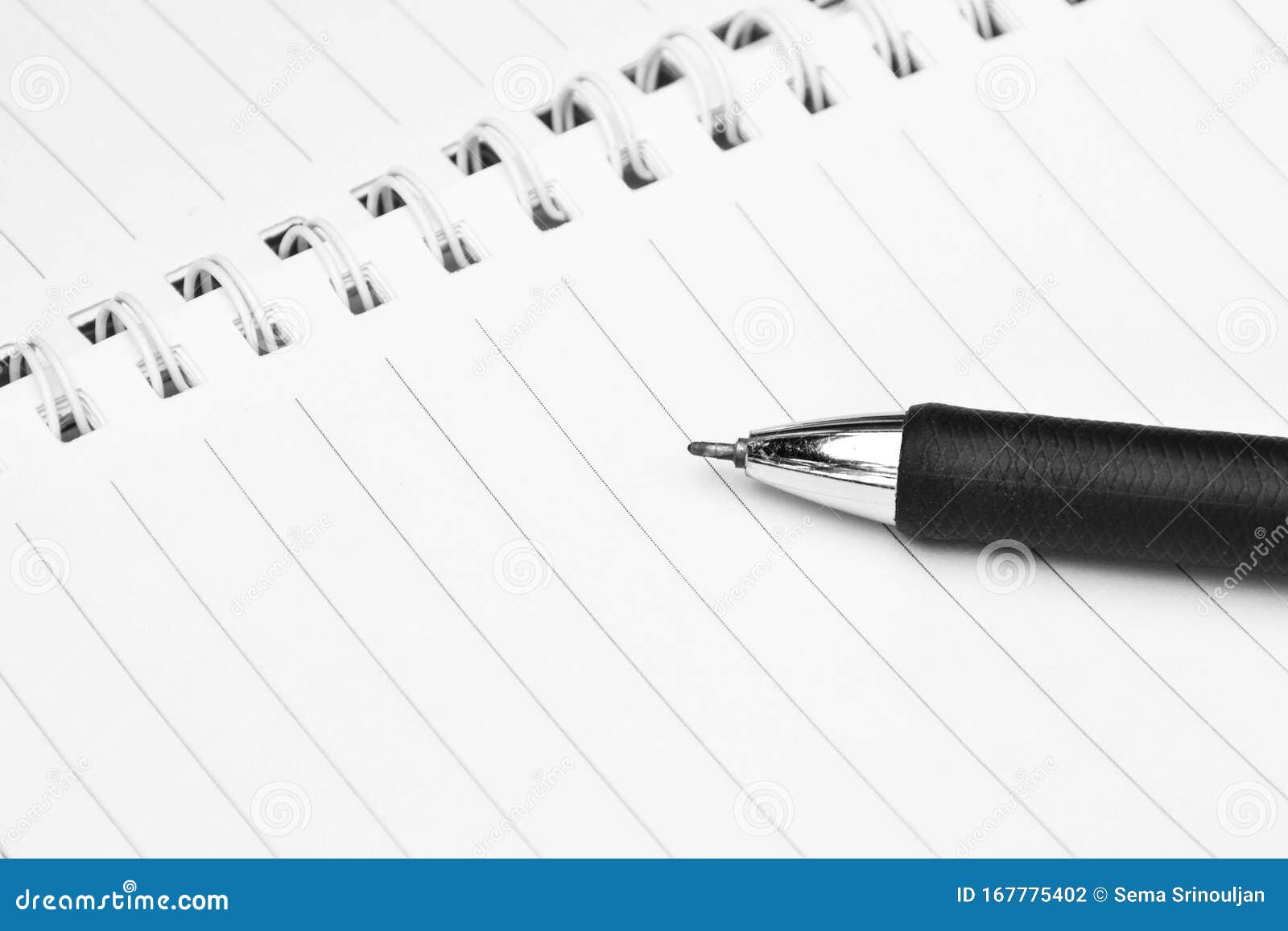 Closeup pen on a paper. stock photo. Image of empty - 167775402