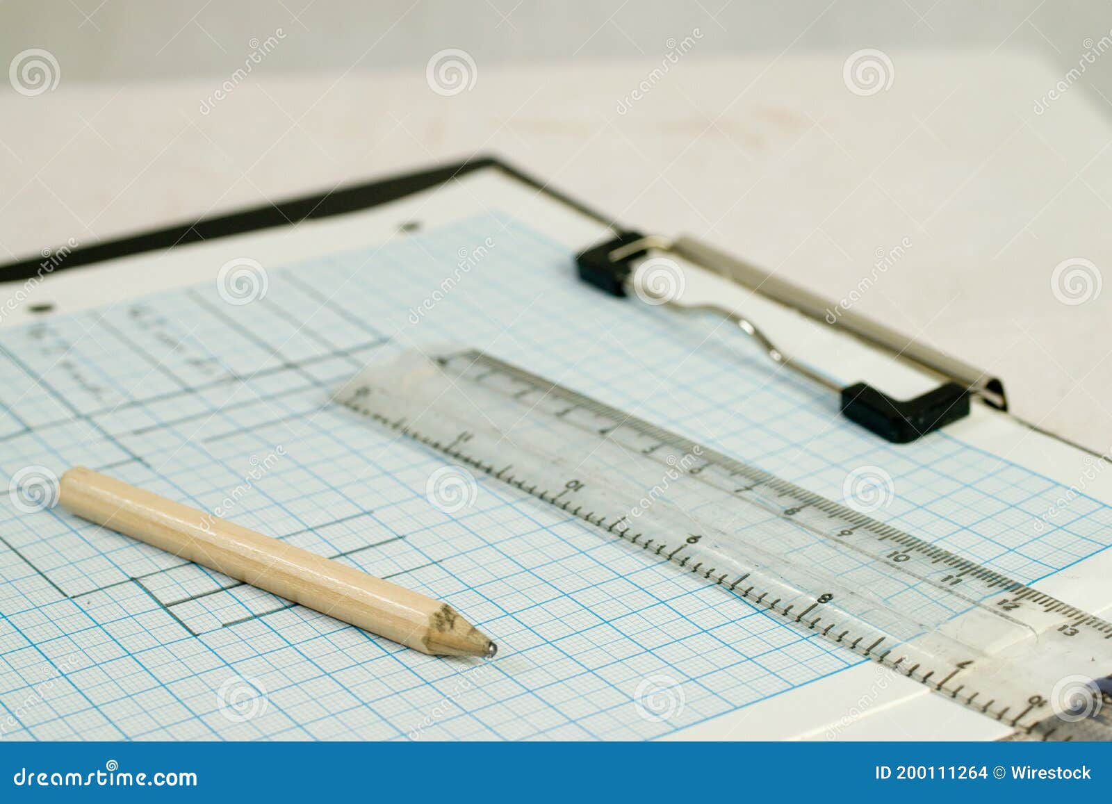 Closeup of a Pencil and a Ruler on a Graph Paper Stock Photo - Image of ...