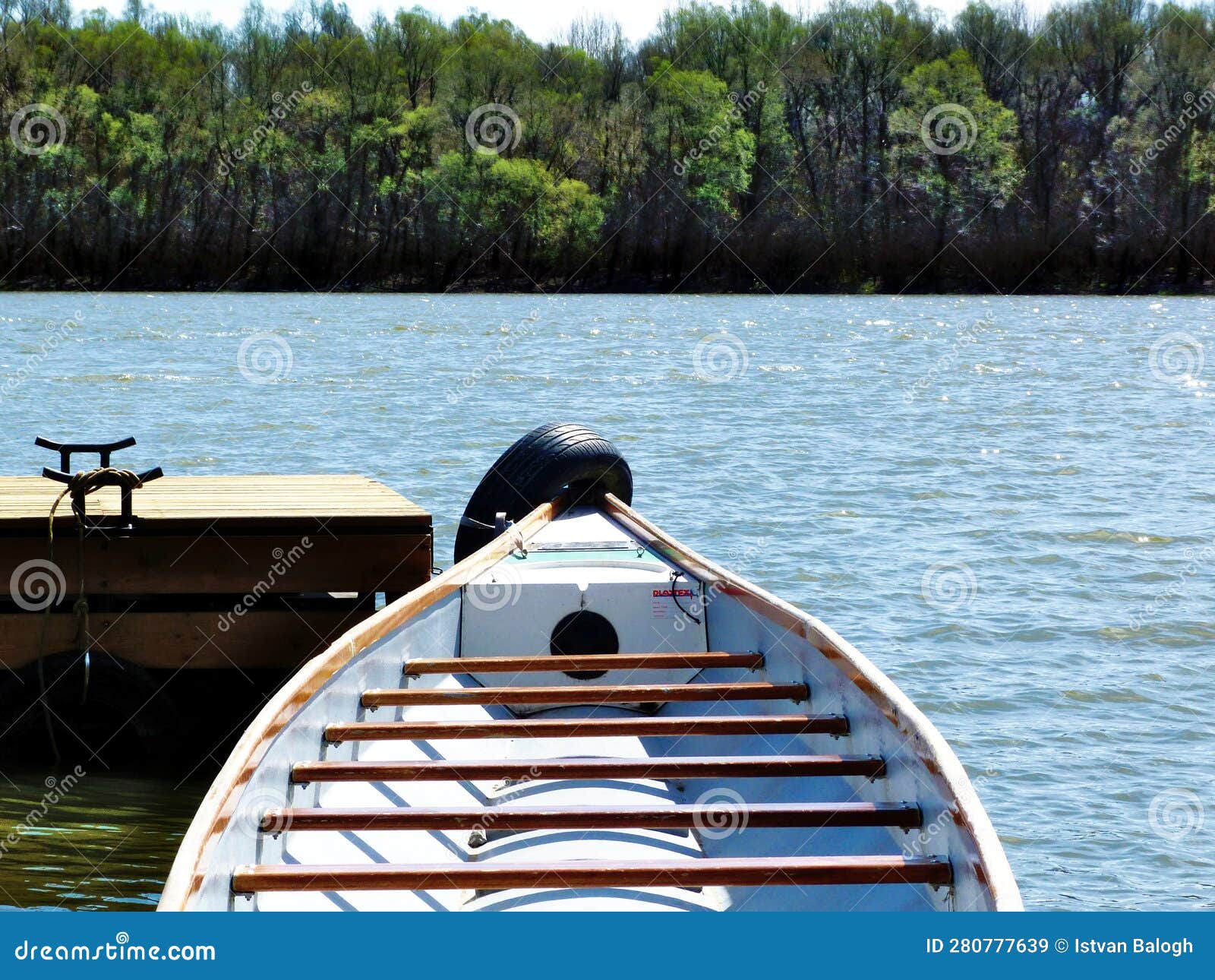 Perspective Closeup View of Empty Rowing Canoe. Skull 8 Moored at a ...