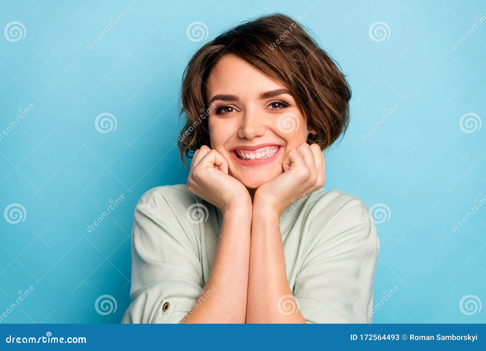 Closeup Photo Of Attractive Lady Short Hairdo Arms Hold Chin Head