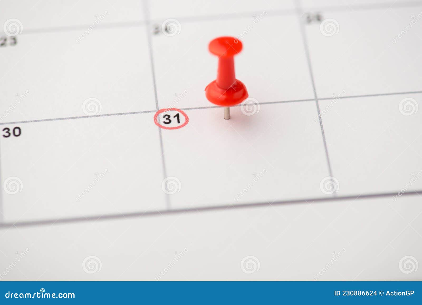 Closeup Photo of Mark on Calendar at Thirty-first with Red Pushpin with ...