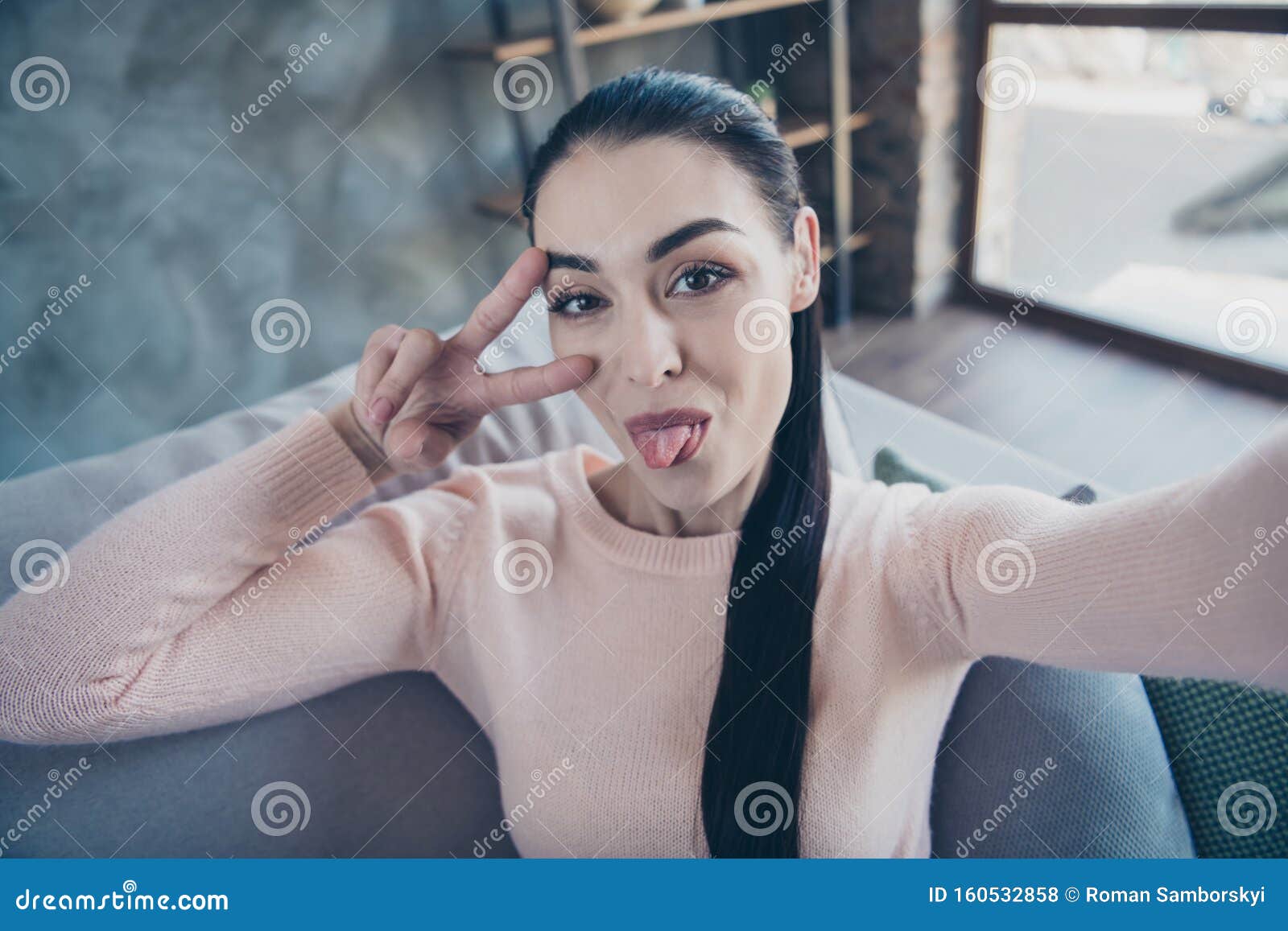 Closeup Photo Of Pretty Lady Having Fun At Home Making Selfies Showing