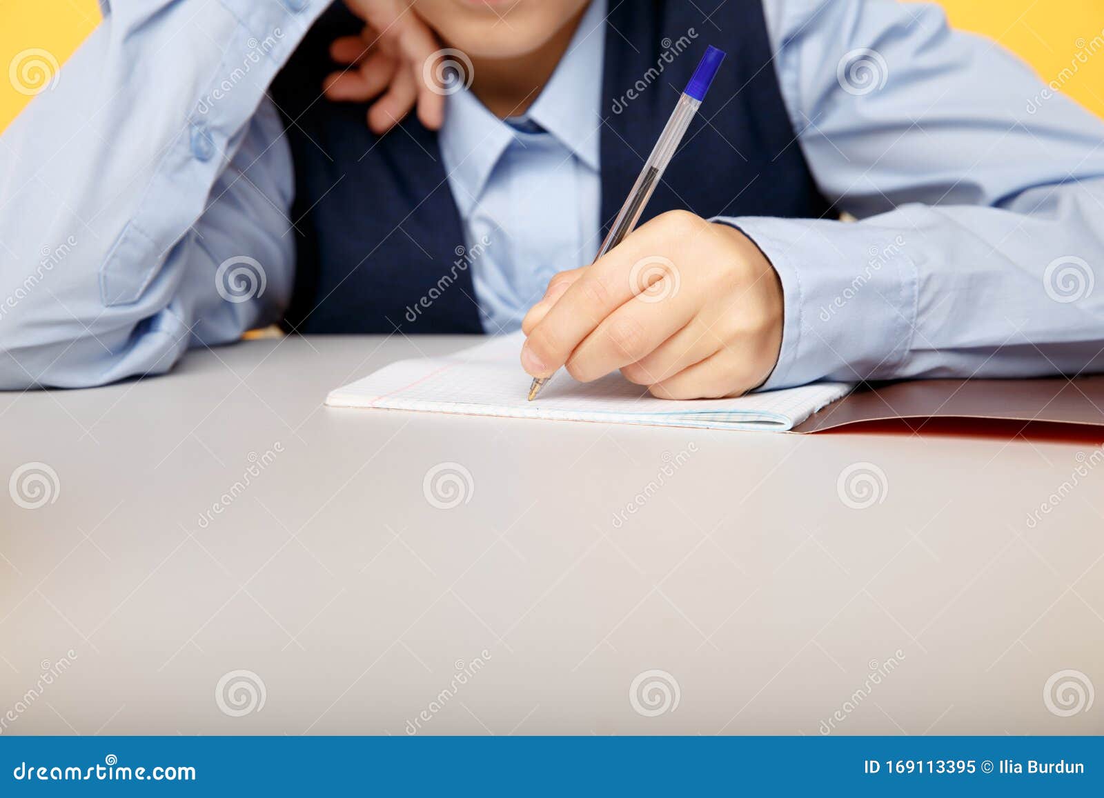 Closeup Photo of Pupil Writing at the Lesson. Stock Image - Image of ...