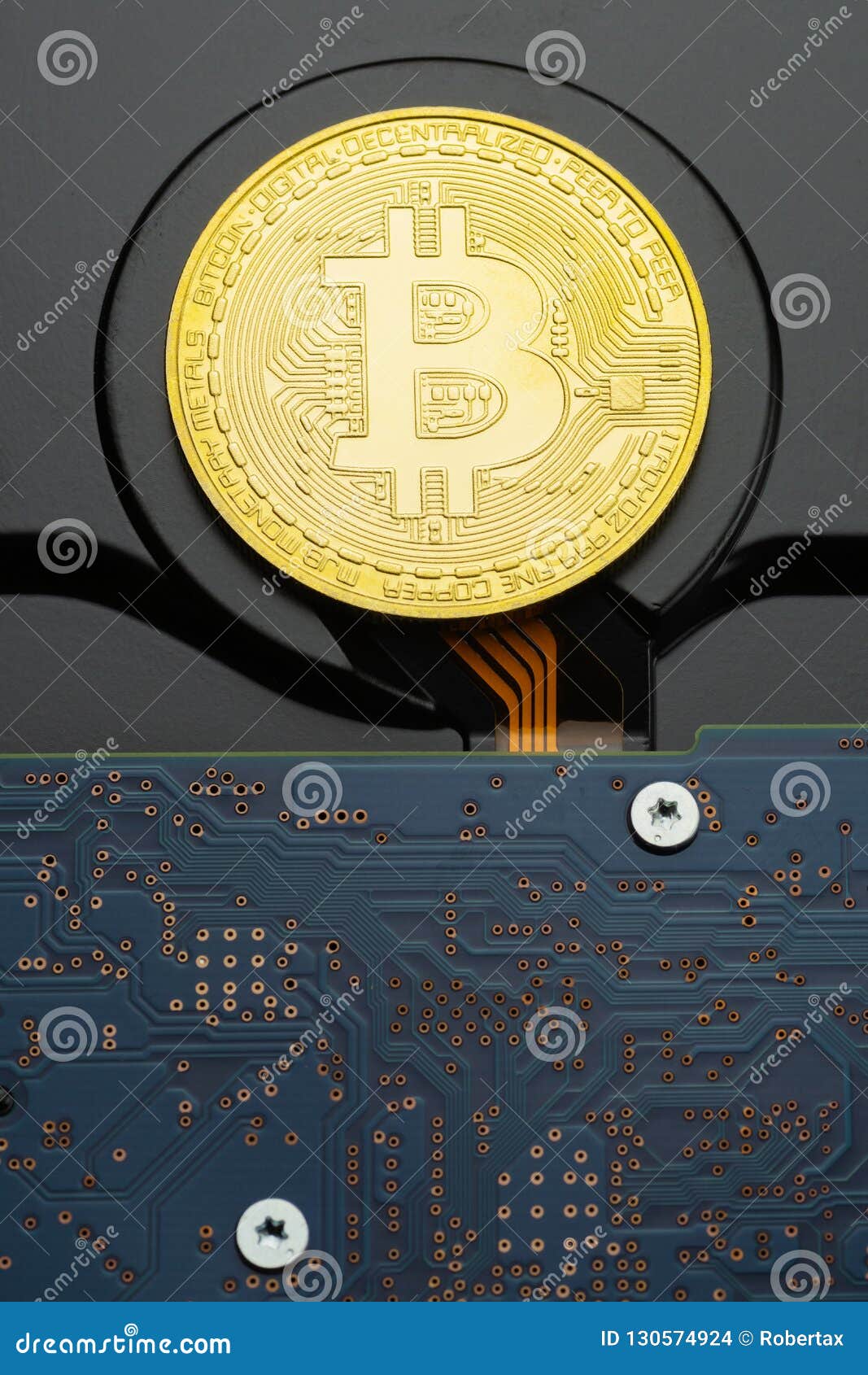 Closeup of Physical Bitcoin Criptocurrency Coin on Hard Disk Drive ...