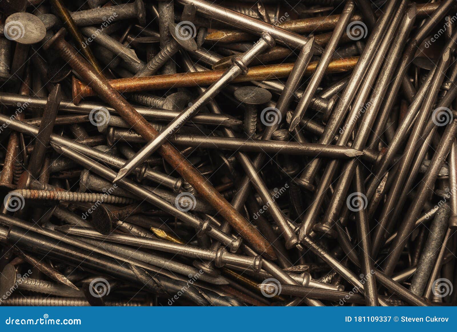 Closeup of a Pile of Random Assorted Nails Rusty and Shiny with Strong ...