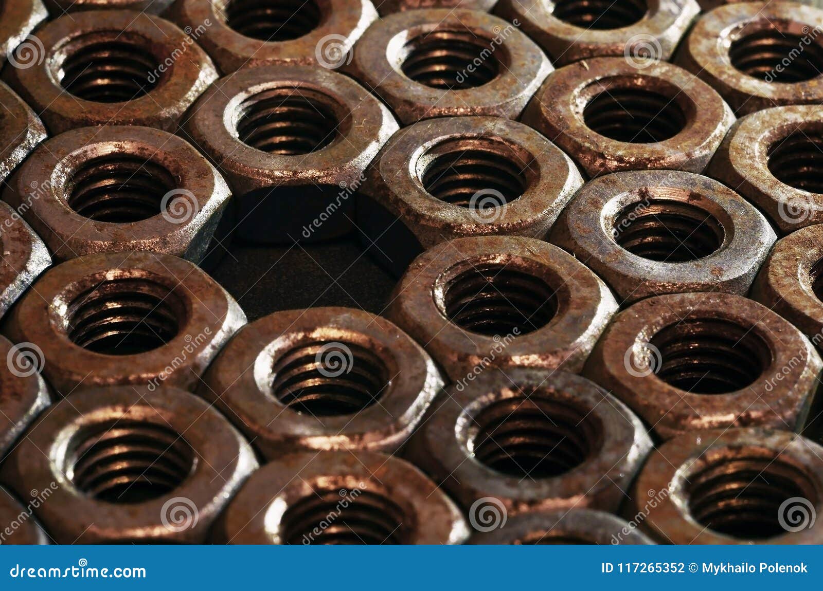 Close-up of rusty nuts stock photo. Image of hardware - 117265352