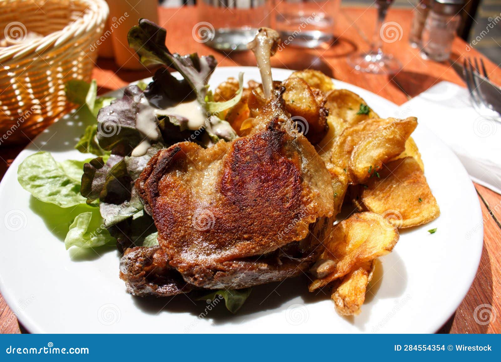Closeup of a Plate of Confit De Canard in a Restaurant Stock Photo ...