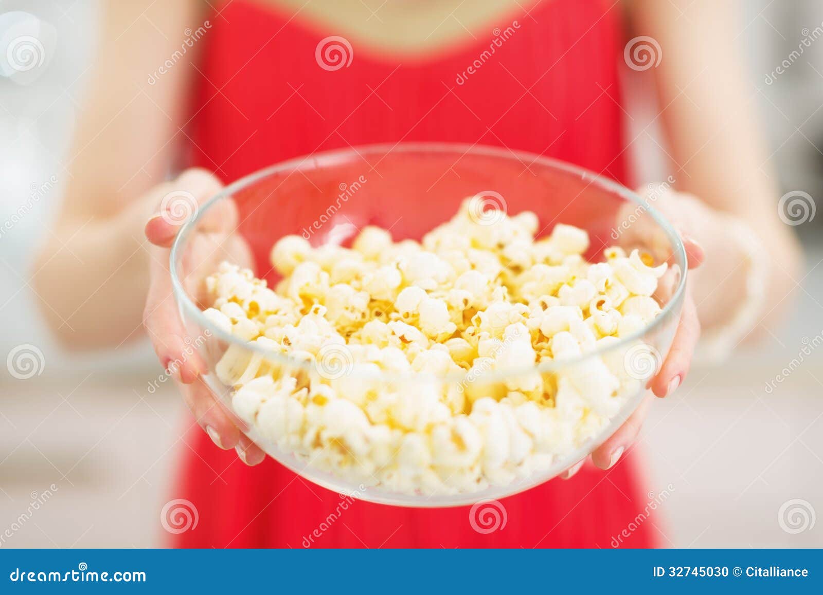 Closeup on Plate with Popcorn in Hand of Young Woman Stock Photo ...