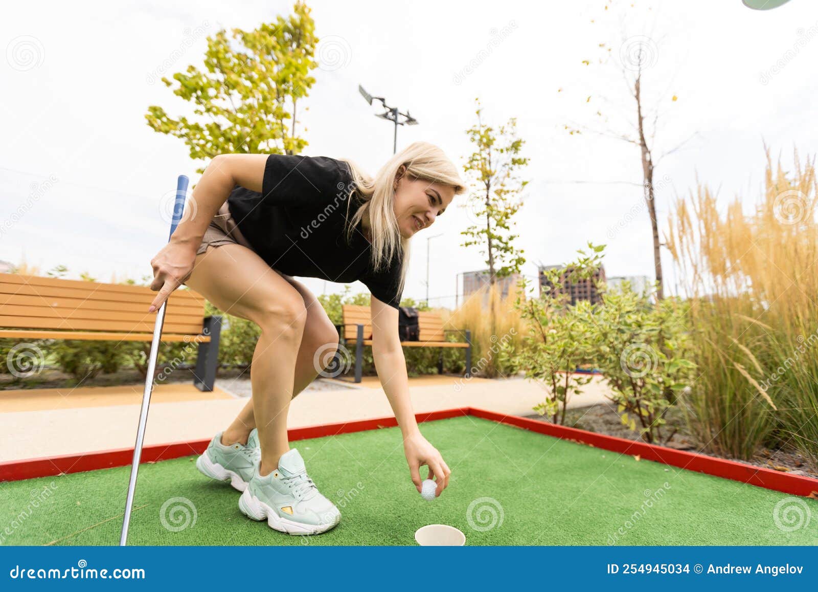 Closeup of Player Play Mini Golf with Ball Stock Photo - Image of golf ...