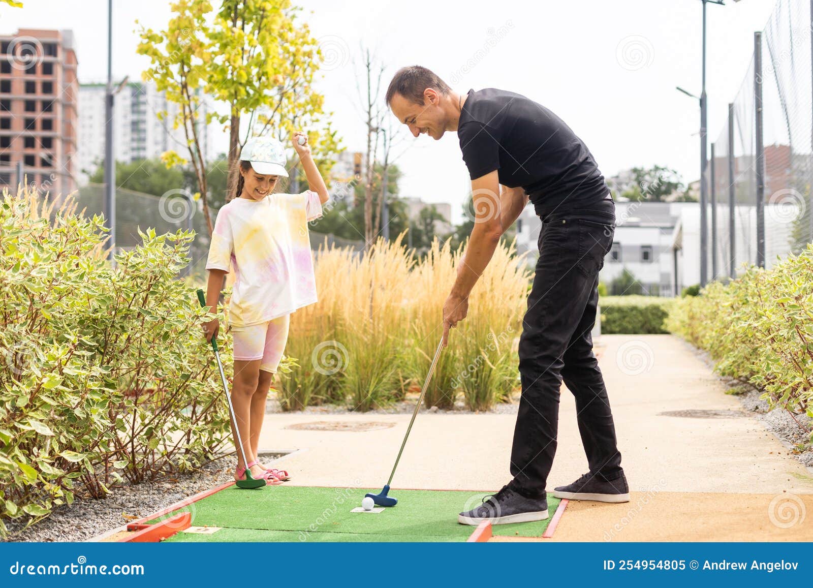 Closeup of Player Play Mini Golf with Ball Stock Image - Image of field ...