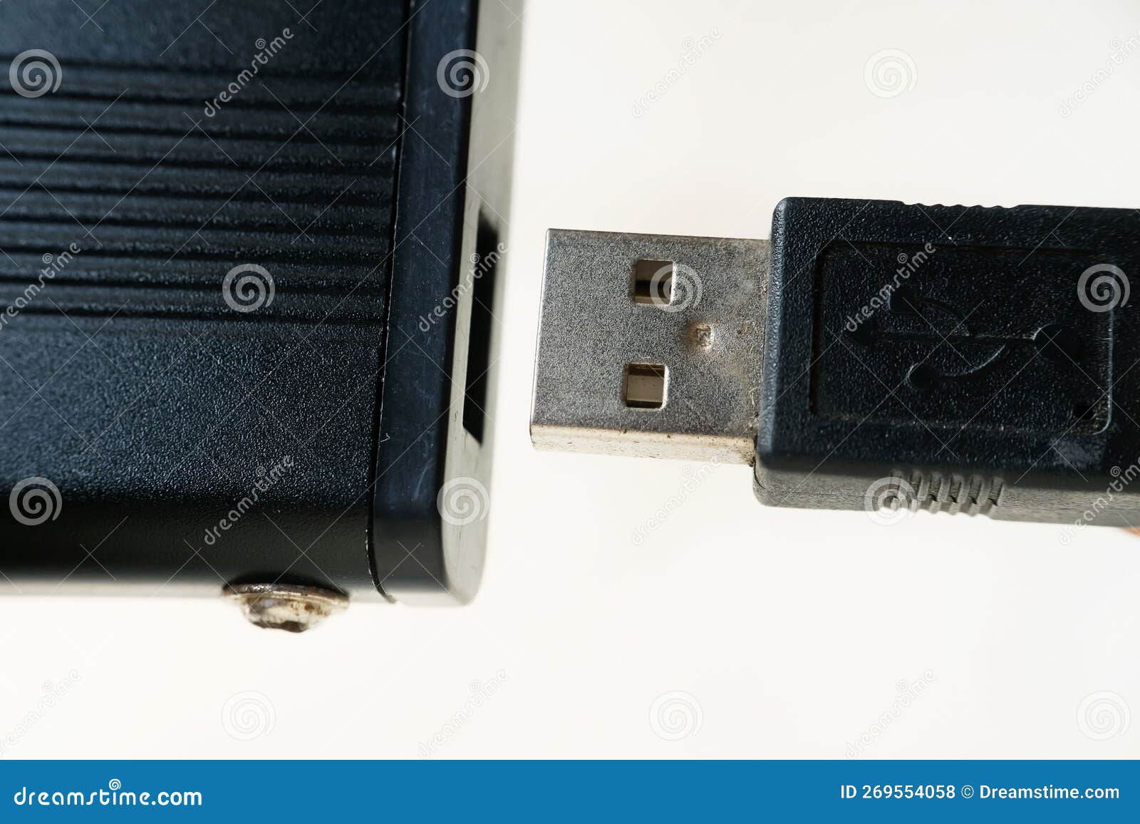 Closeup of Plugging the USB Cable into the Data Storage Port Stock ...