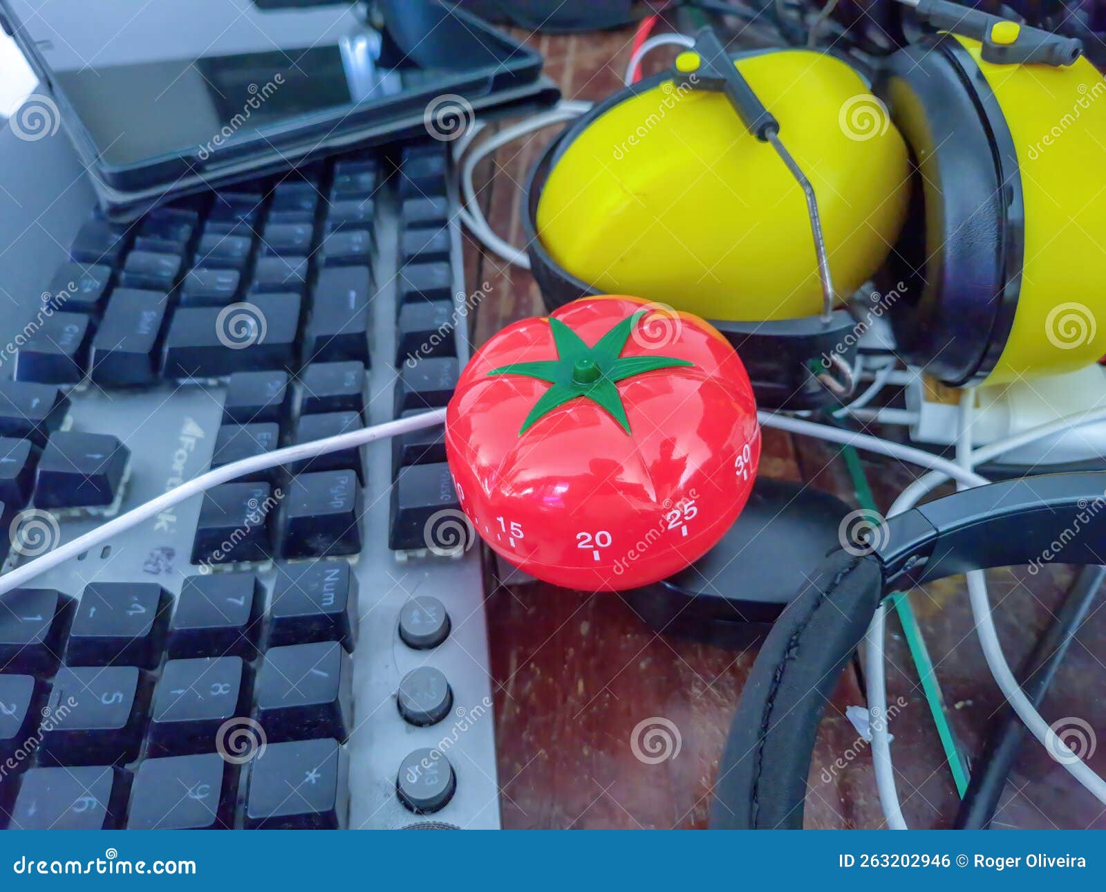 Closeup of Pomodoro Kitchen Timer Laying on Wooden Table Stock Photo ...