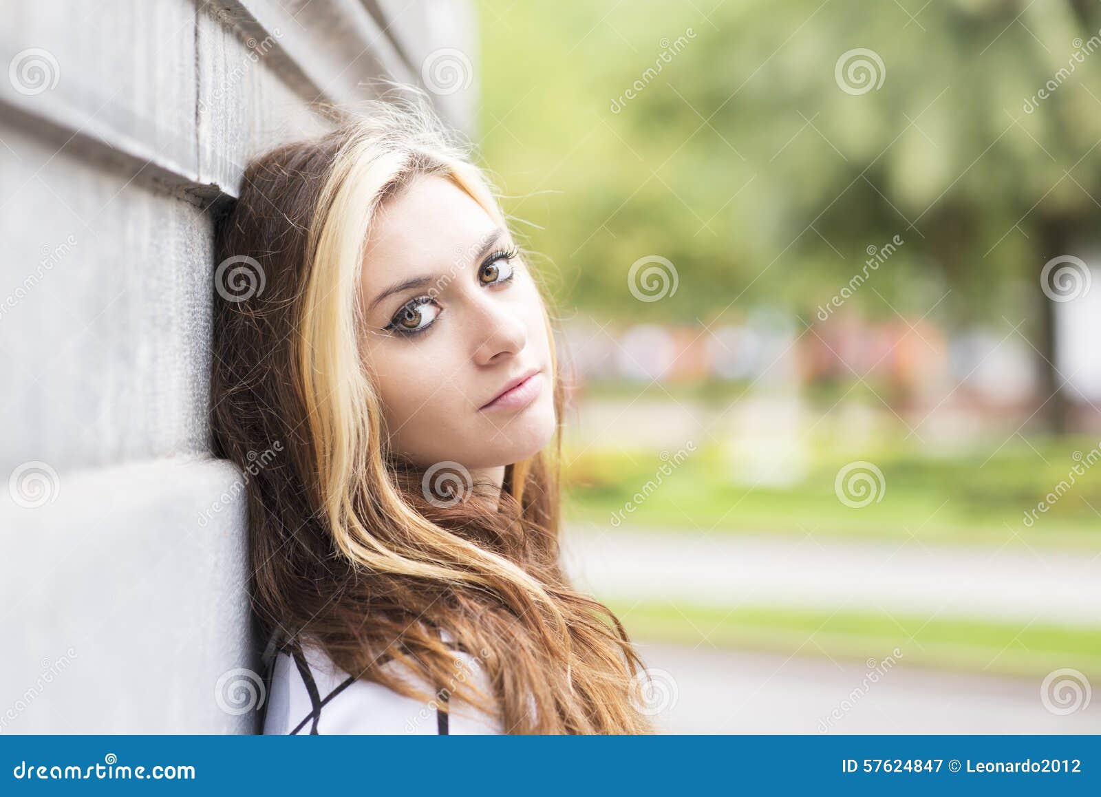 Closeup Portrait Of Beautiful Girl Looking At The Camera In The Stock