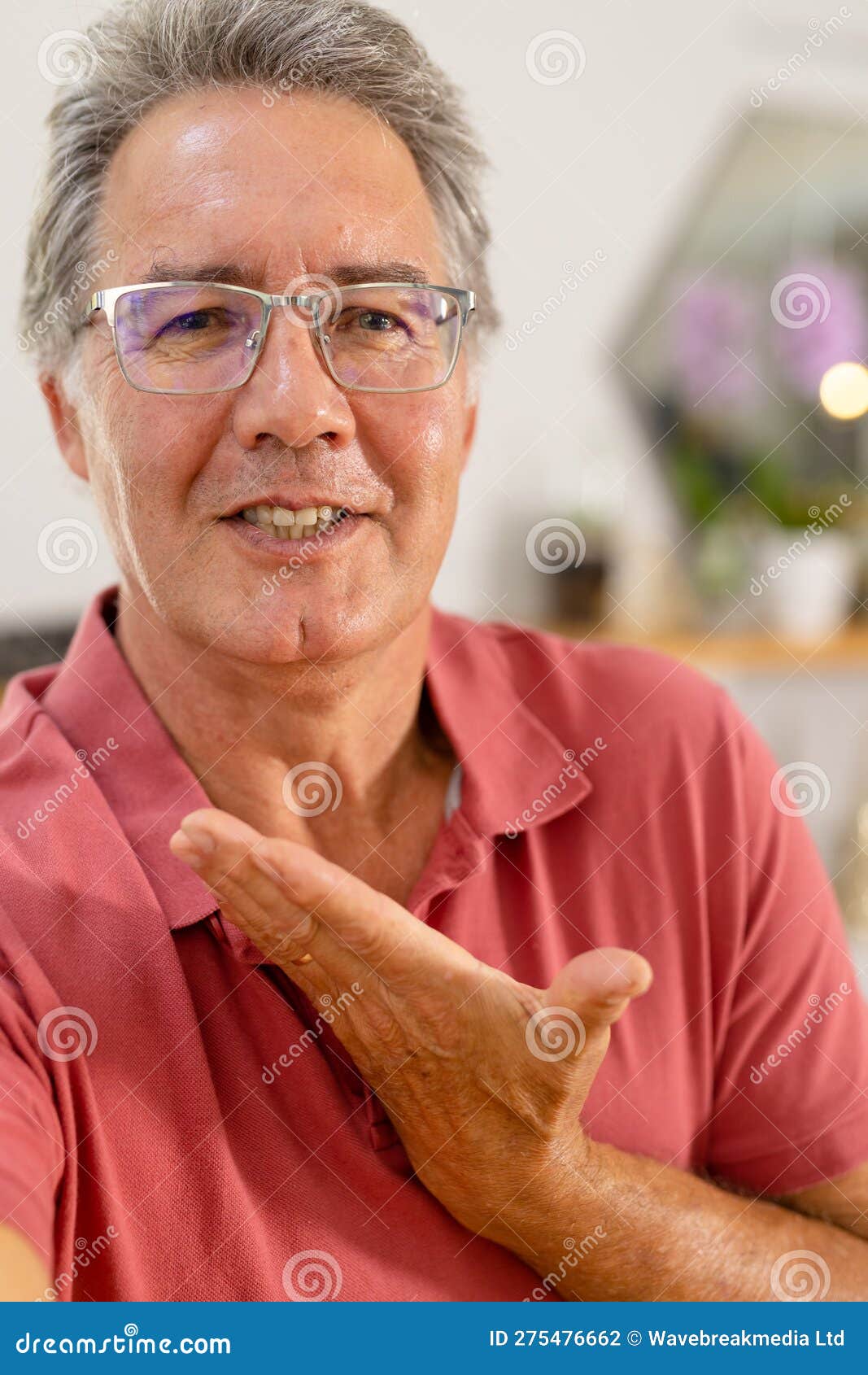 Closeup Portrait Of Caucasian Smiling Senior Man Wearing Glasses