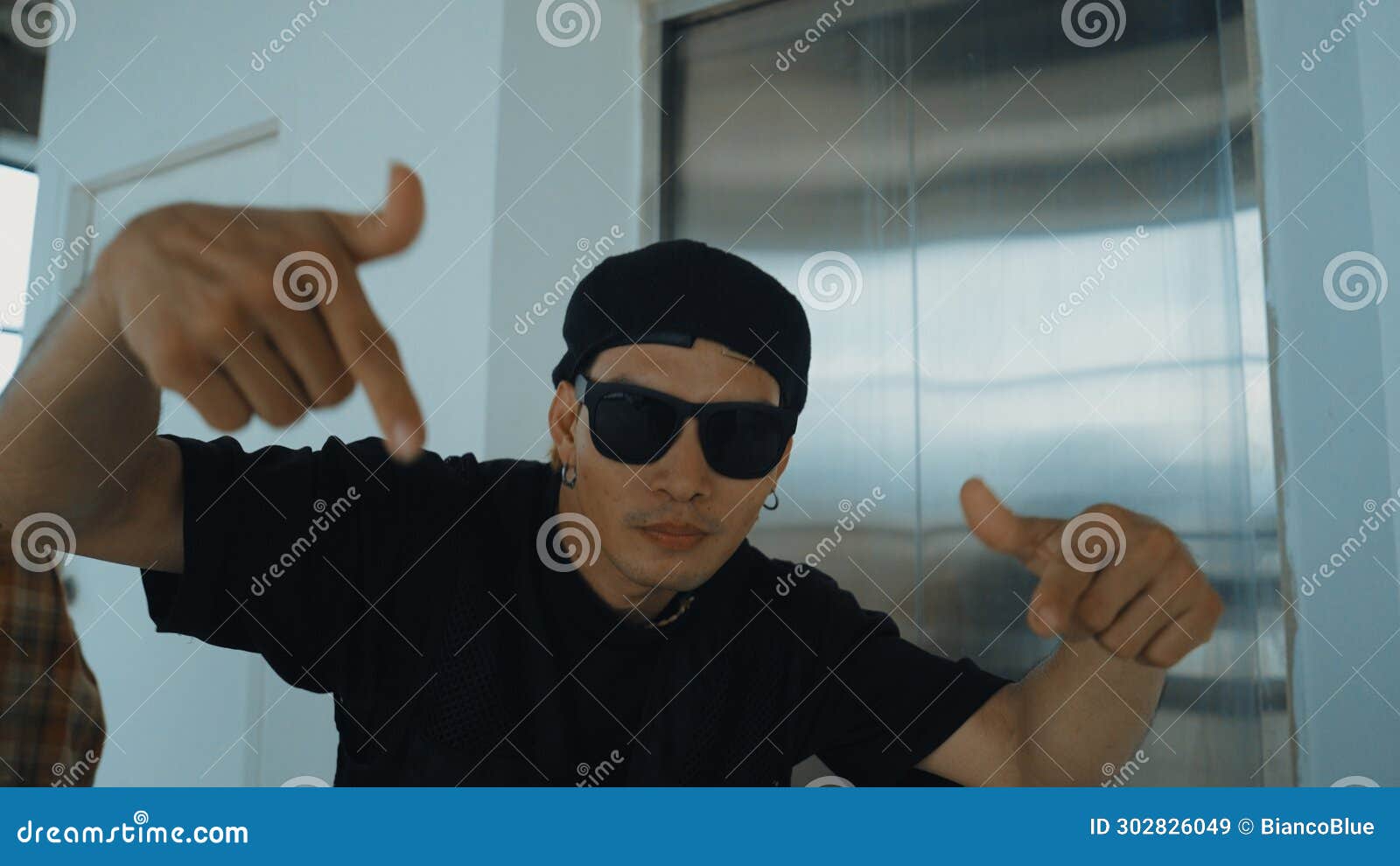 Closeup of Multicultural Hipster Dancing while Looking at Camera ...