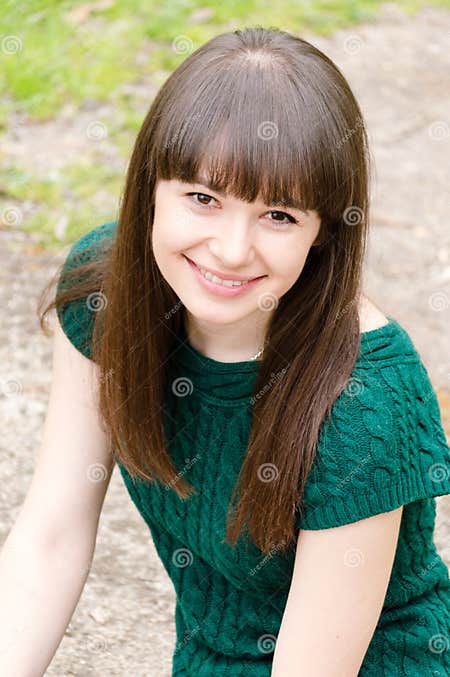 Closeup Portrait Of Young Beautiful Woman Brunette Girl Sitting