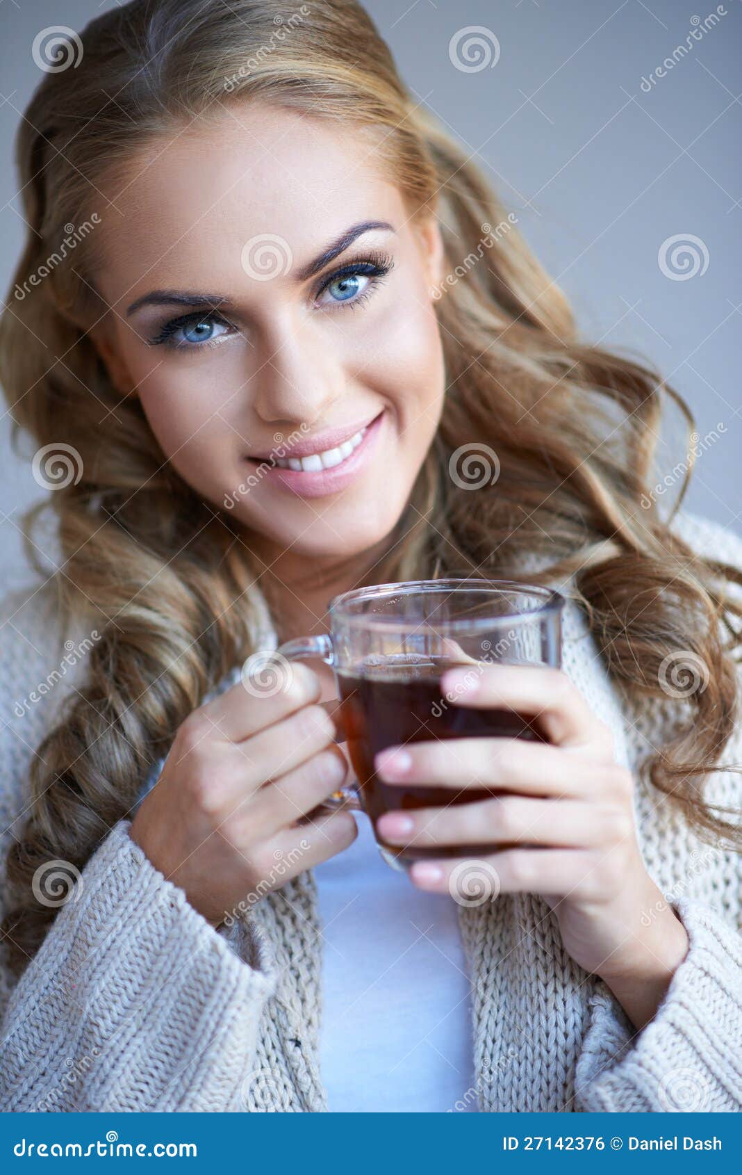 Closeup of a Pretty Woman Holding a Cup of Tea Stock Photo - Image of ...
