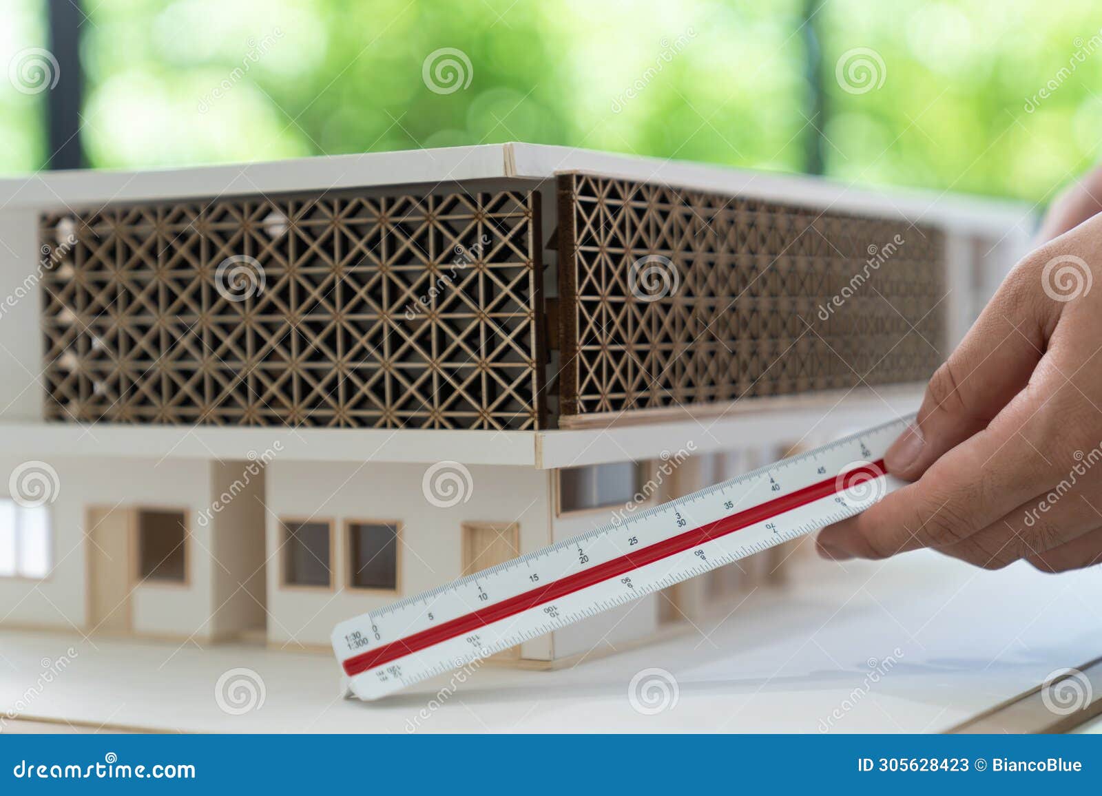 Closeup of Professional Architect Hand Measuring House Model ...