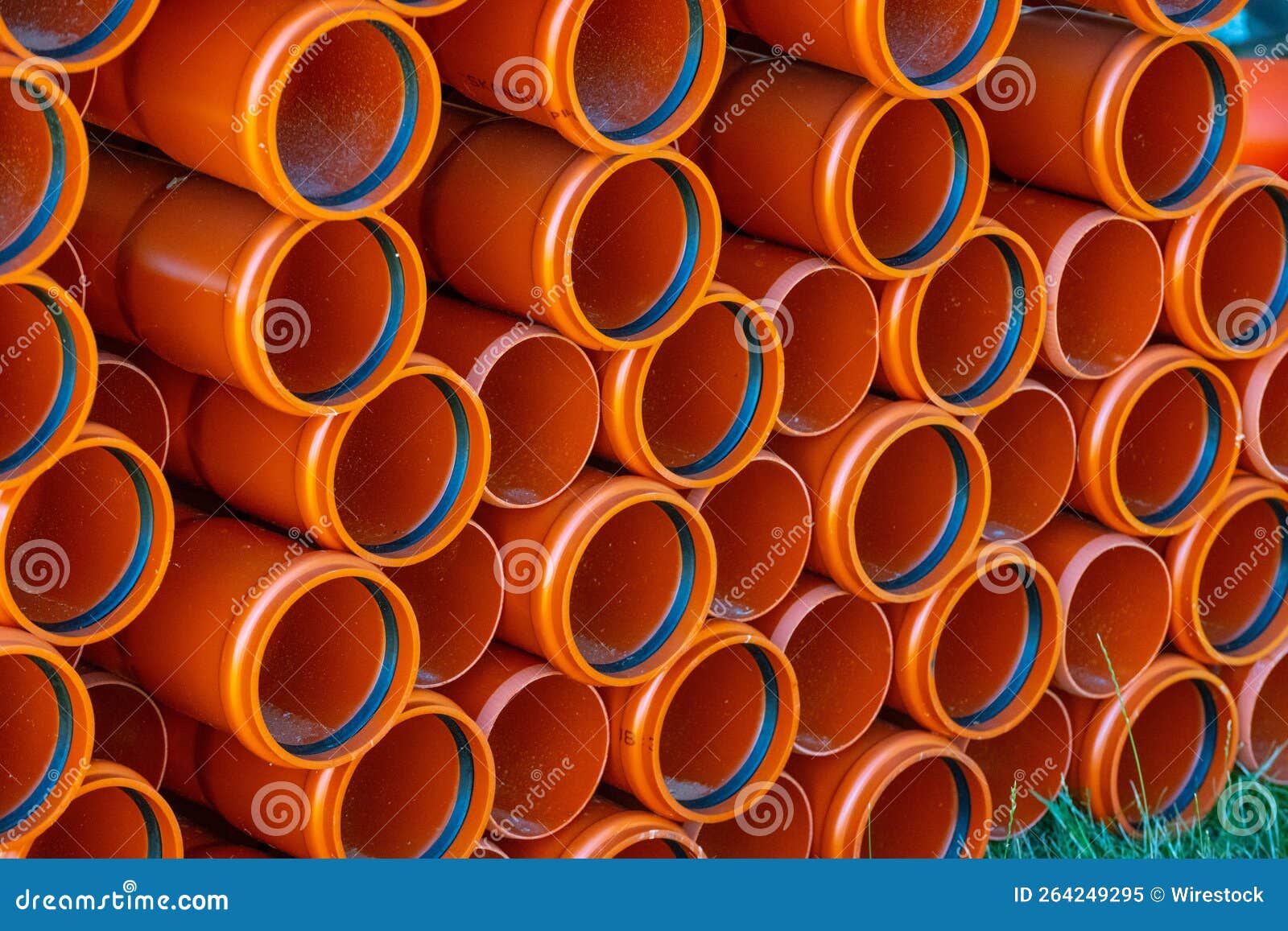 Closeup of Pvc Pipes on a Stack on Green Grass Stock Image - Image of ...