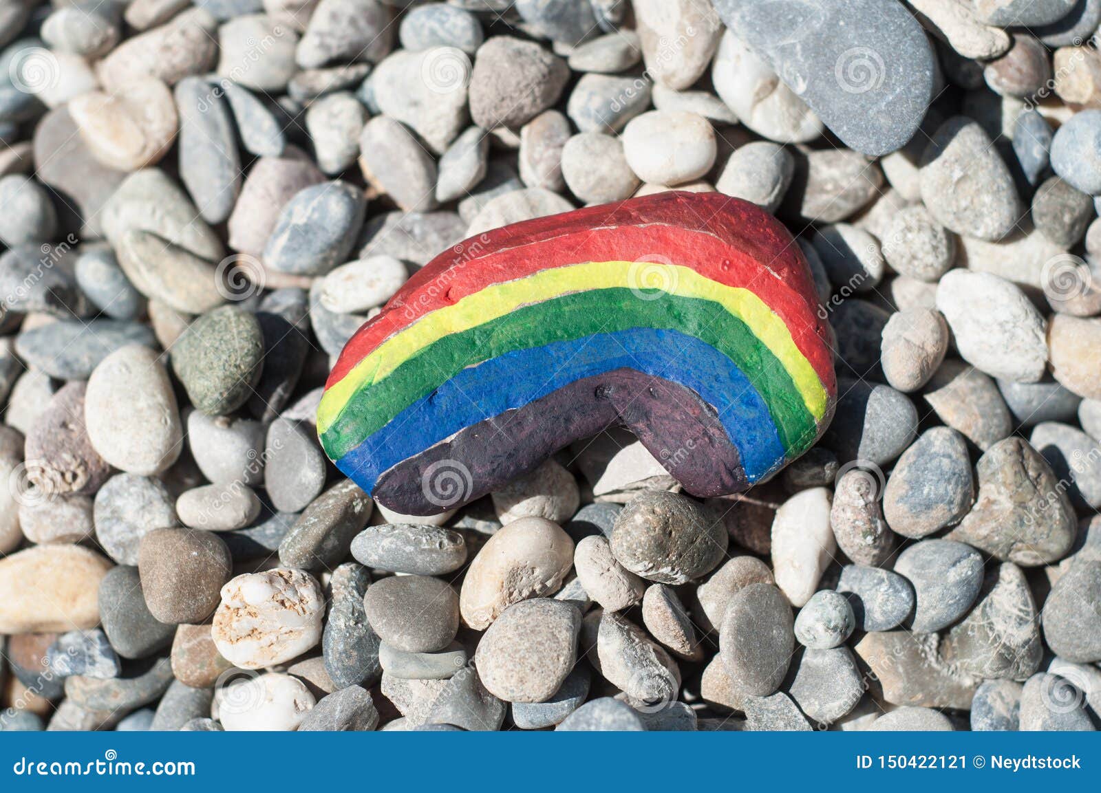 Rainbow Painting on Stone Pebble on Pebble Beach Stock Image - Image of ...