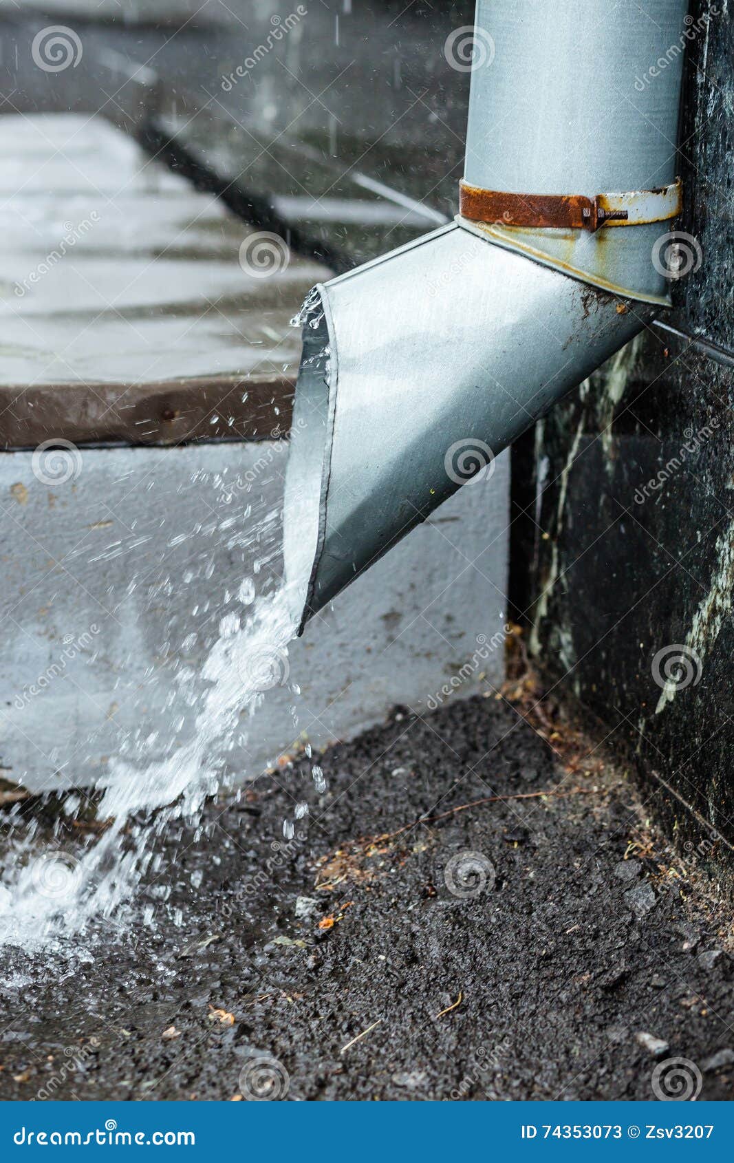 Closeup Rainwater Flow from the Drainpipe Installed on Brick Wall ...