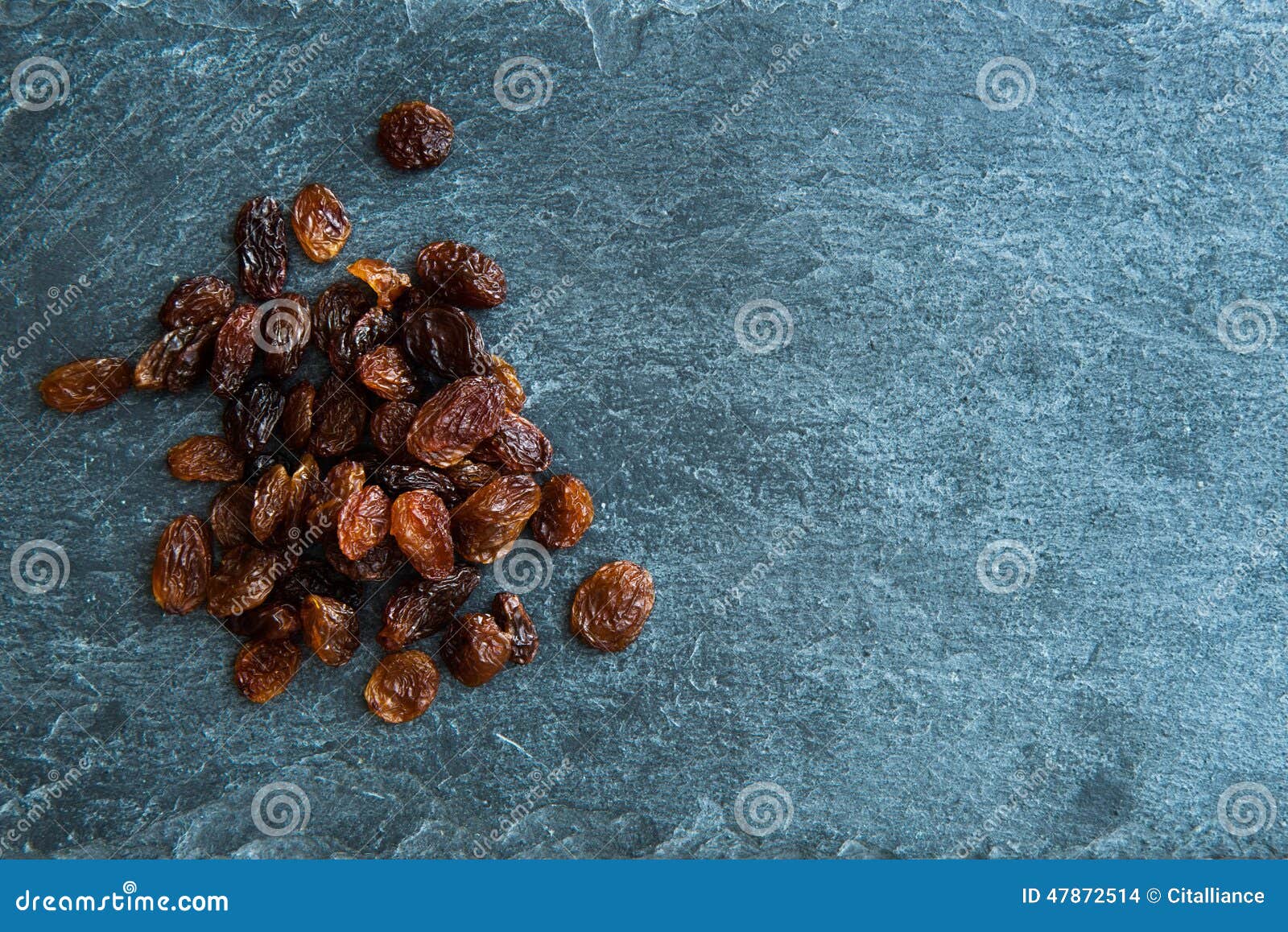 Closeup on Raisins on Stone Substrate Stock Photo - Image of raisin ...