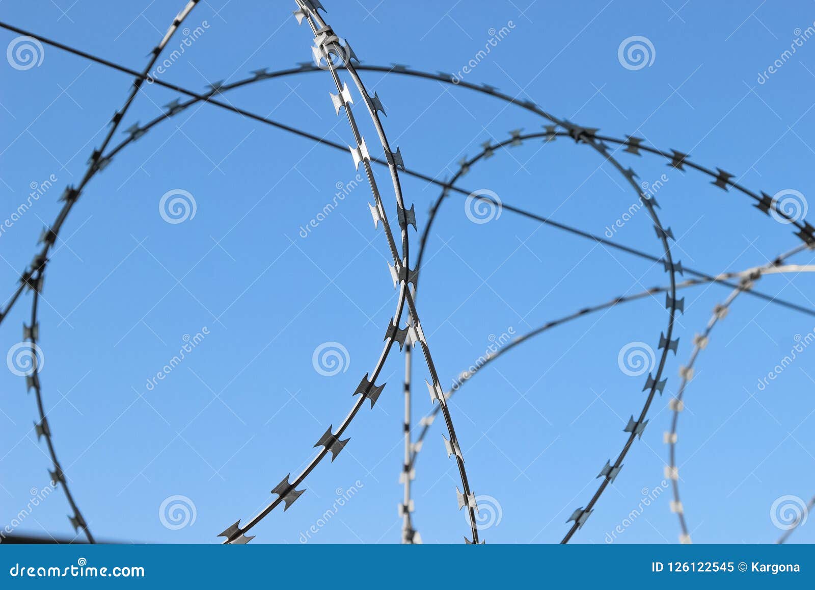 Closeup of a razor wire stock image. Image of freedom - 126122545