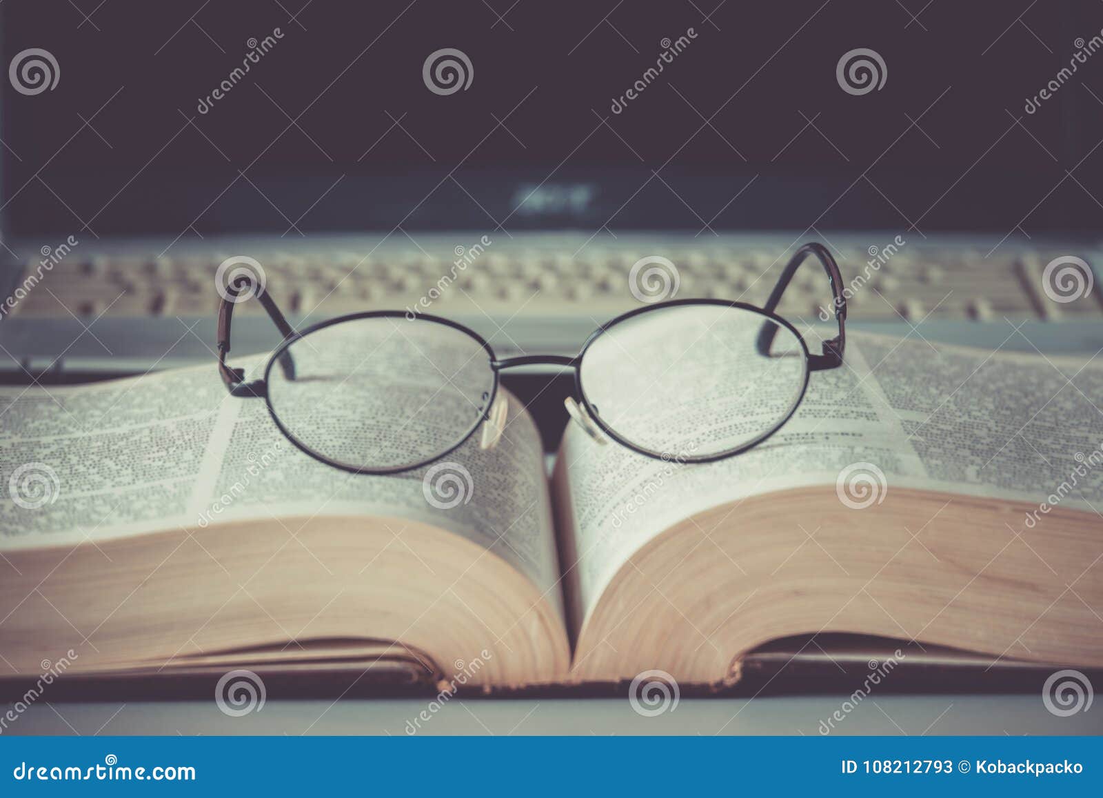 Closeup of Reading Glasses on the Book Stock Image - Image of ...