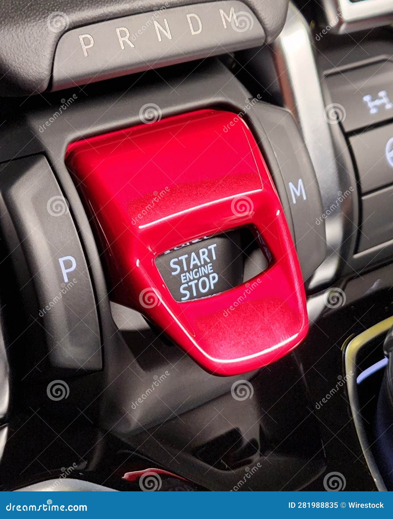 Closeup of a Red Car Dashboard Featuring a Button for Controlling the ...