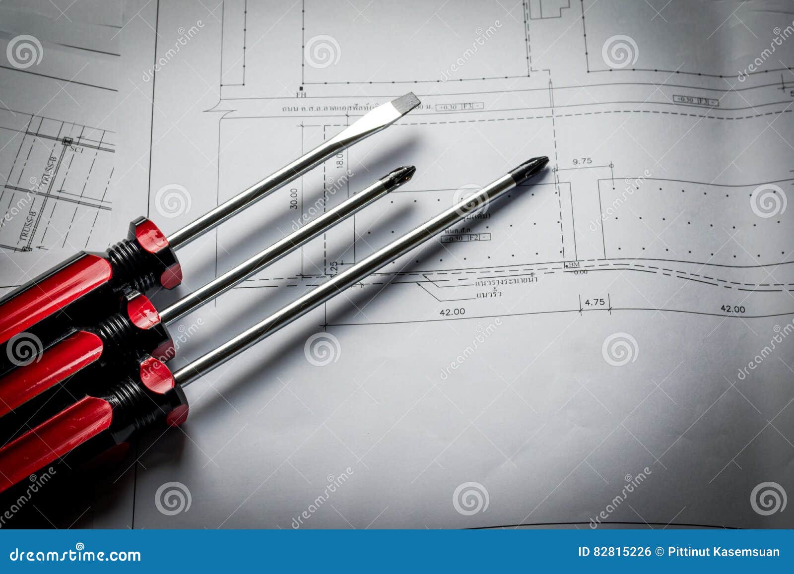 Closeup Red Screwdriver Work Equipment with Diagram Paper Plan Stock ...