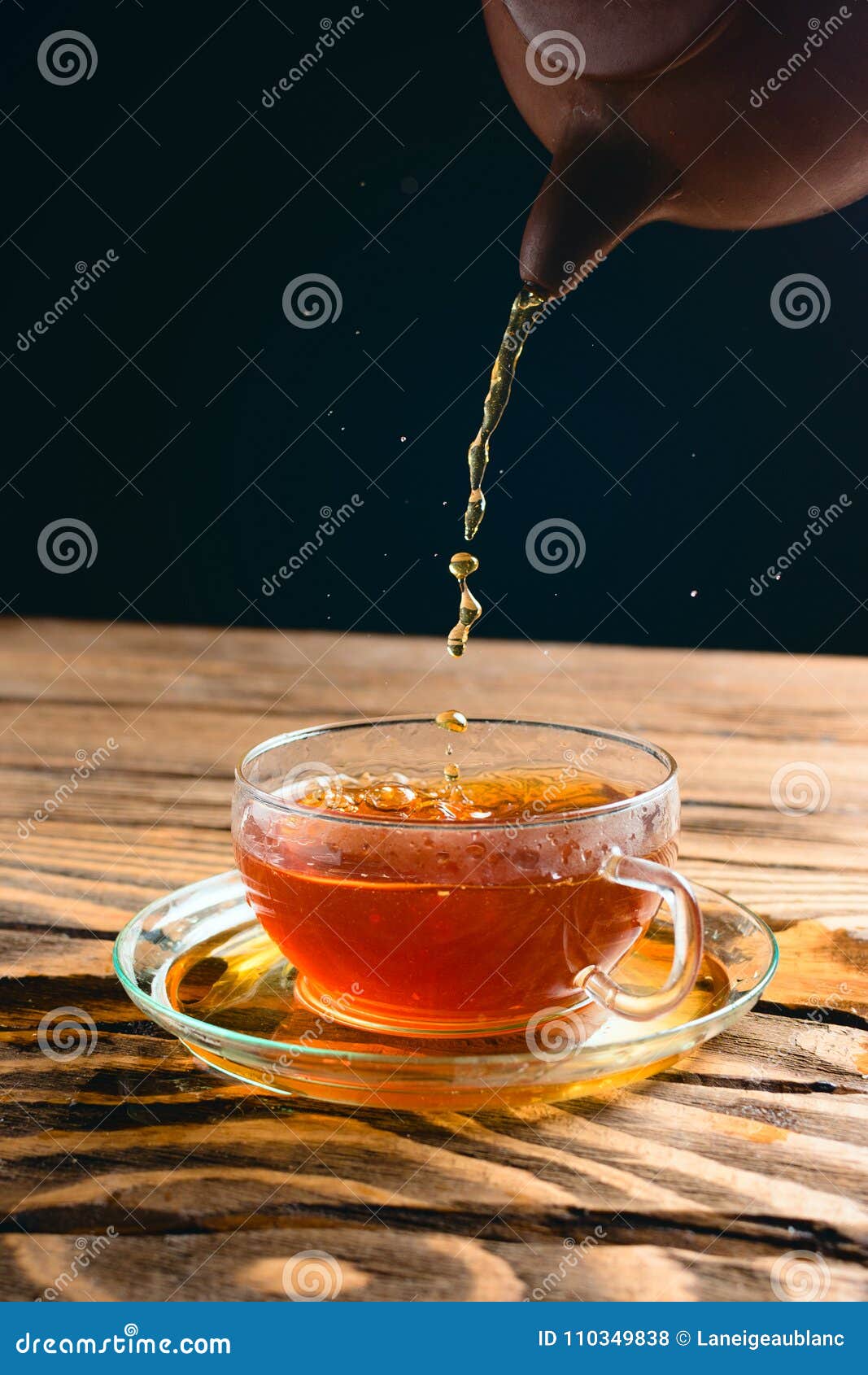 Closeup of Red Tea Pouring into a Cup Stock Photo - Image of green ...
