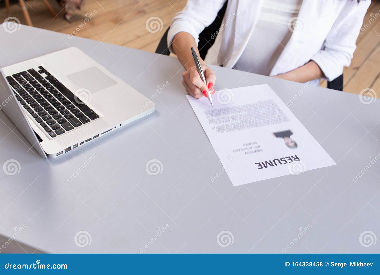 Closeup of Resume Laying on the Office Table in Front of HR Stock Photo ...