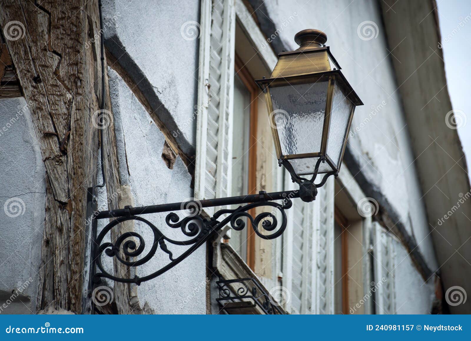 Retro Street Light on Medieval House Facade in the Street Stock Image ...