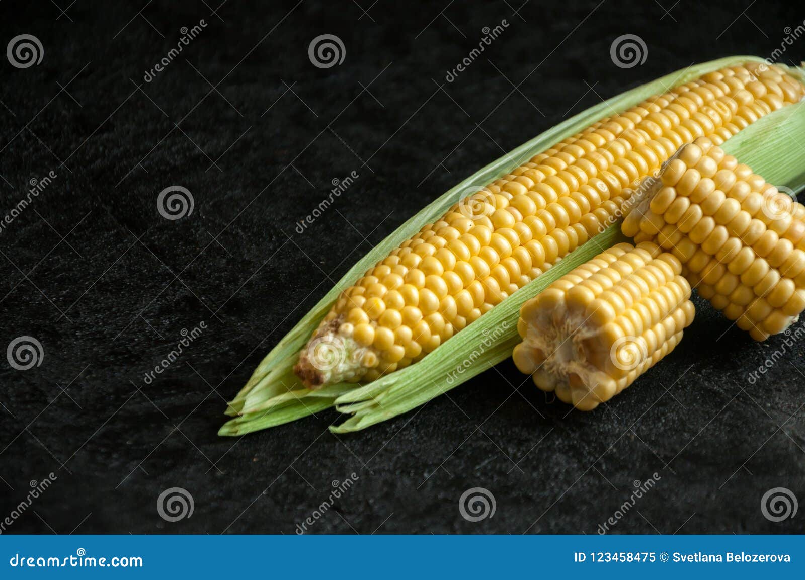 Closeup Ripe Fresh Corn on Dark Background Stock Image - Image of husk ...
