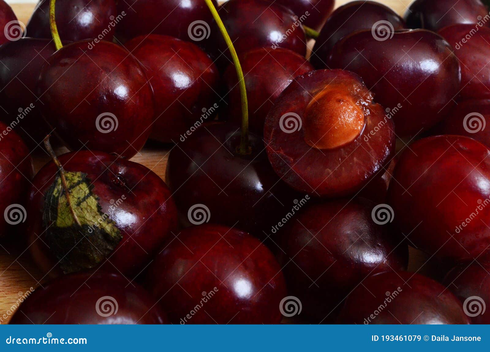 Closeup Ripe Red Cherry, Cut into Half with Stone Stock Image - Image ...
