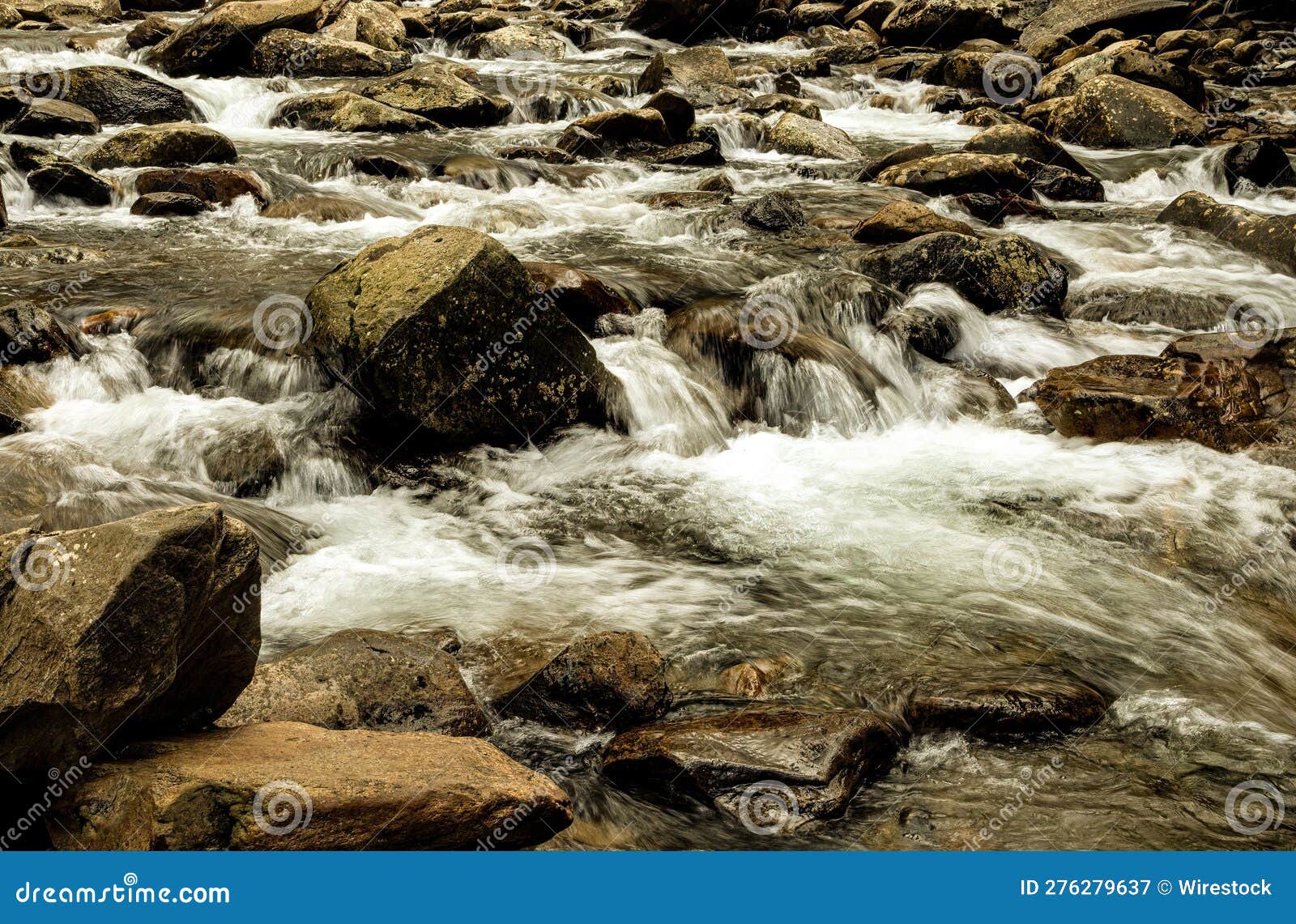 Closeup of a River Flowing through Large Rocks Stock Image - Image of ...