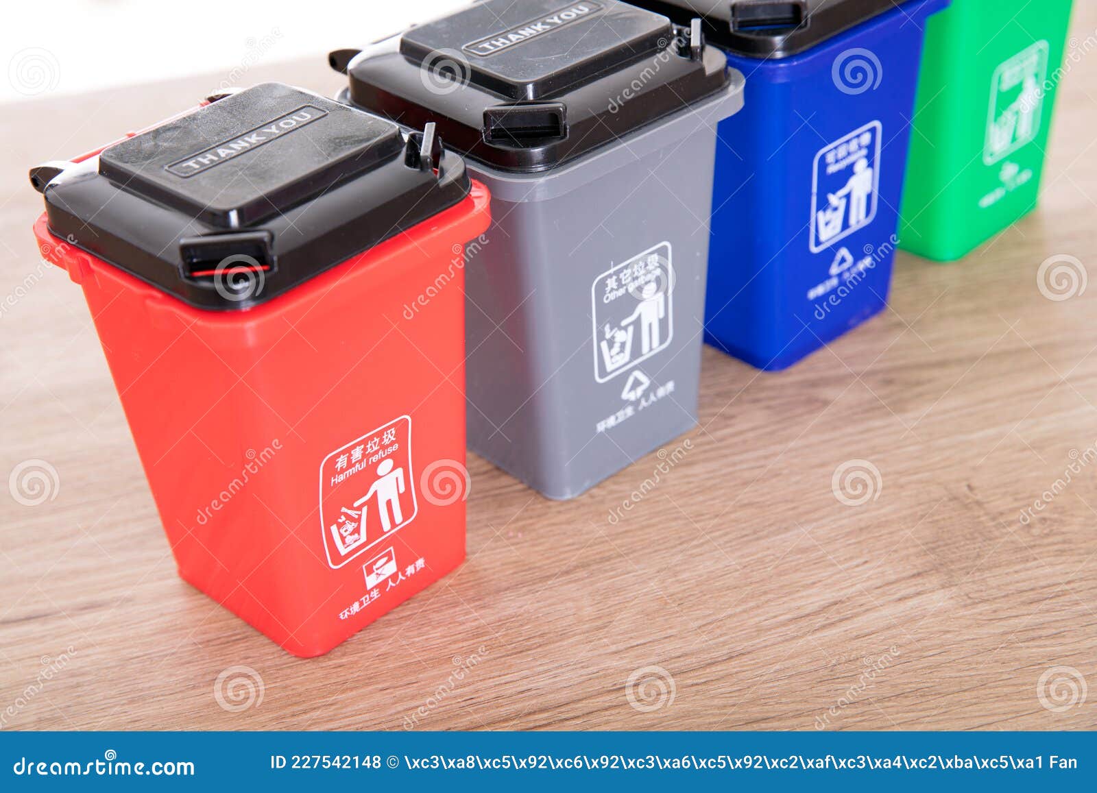 Closeup of a Row of Garbage Sorting Bins Stock Photo - Image of ...