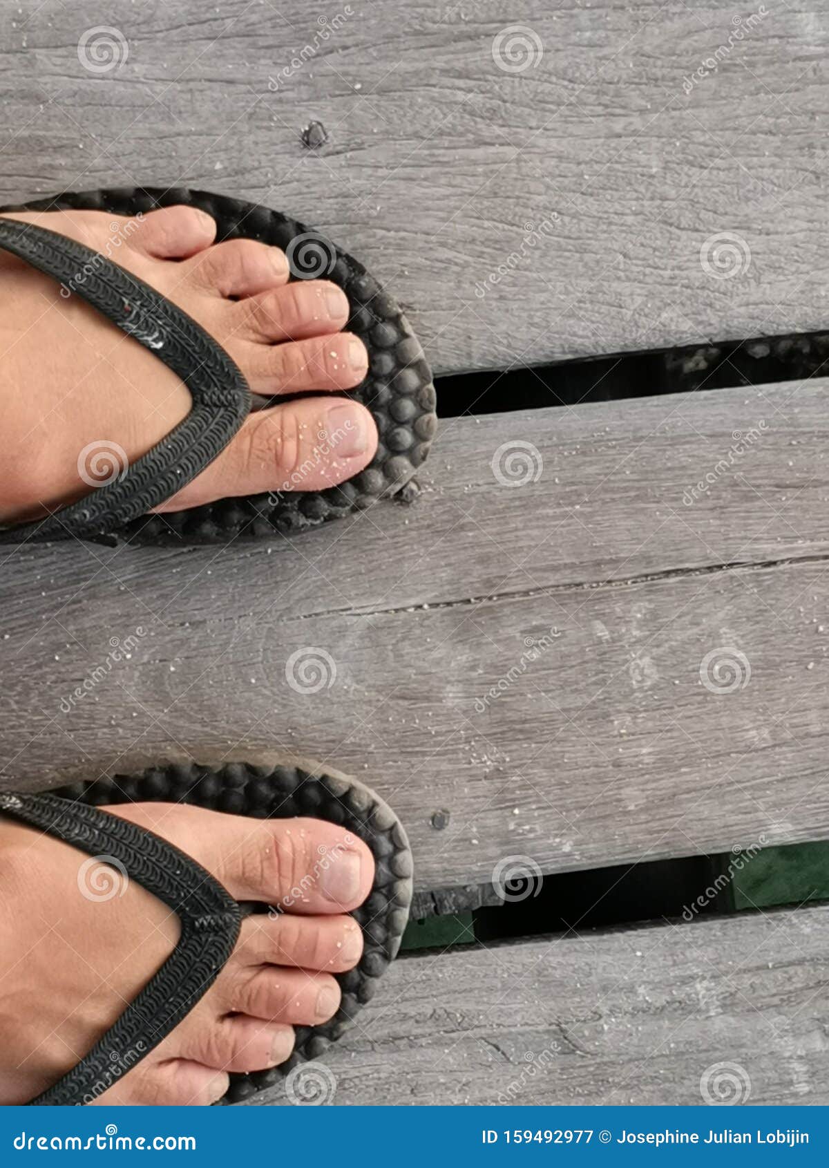 Closeup With Rubber Sandals And Feet On Wooden Path. Royalty-Free Stock ...