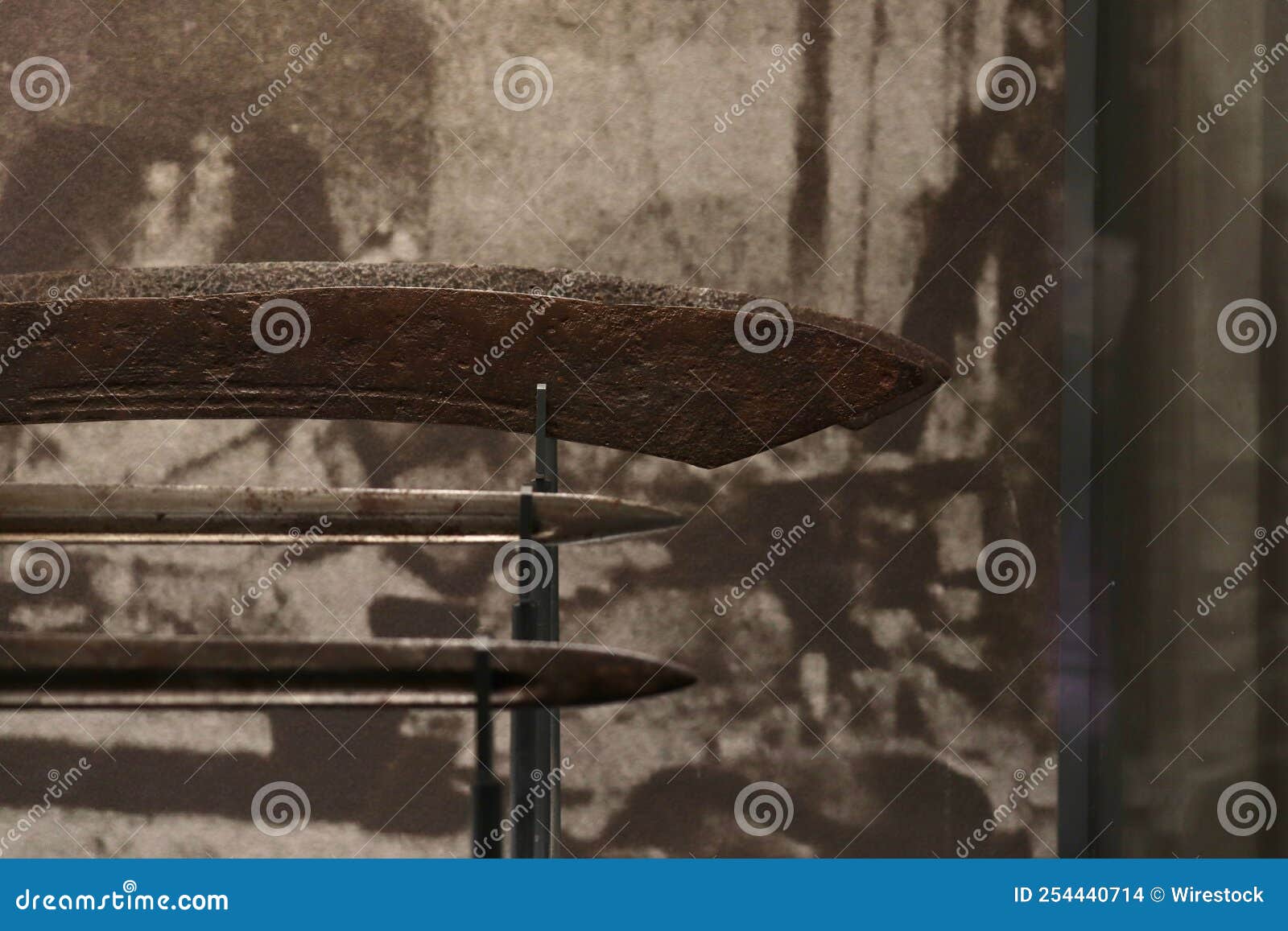 Closeup of Rusty Old Swords on a Stand Stock Photo - Image of wall ...