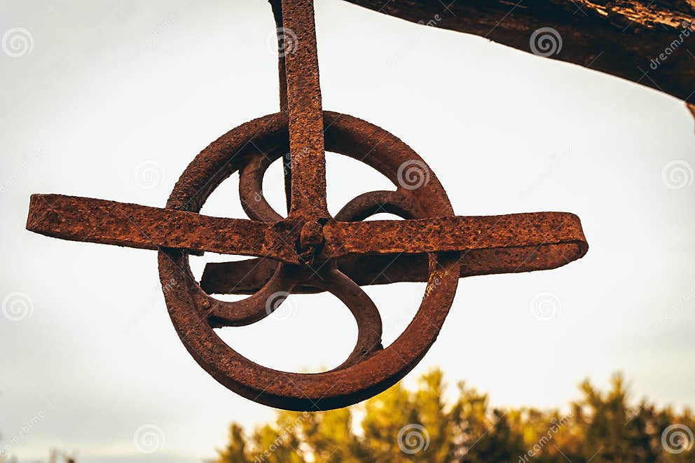 Closeup of a Rusty Well Pulley Stock Image - Image of outdoor, ancient: 310662341