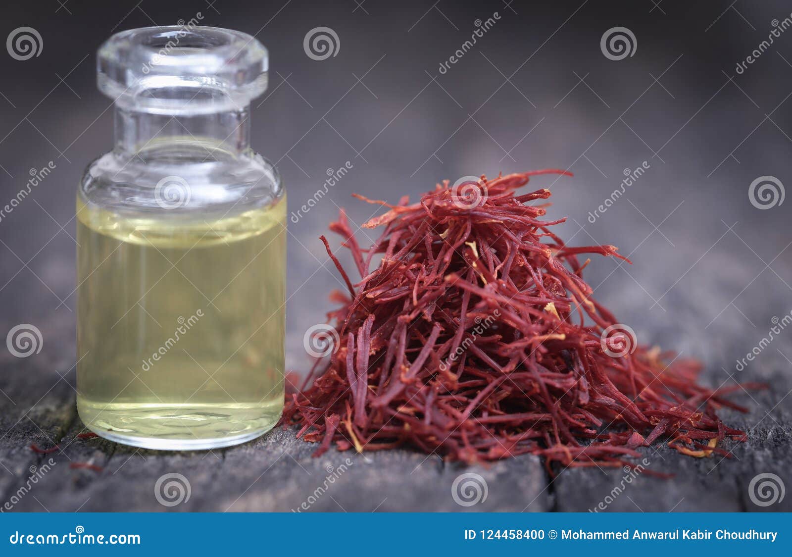 Closeup of Saffron with Extract in a Bottle Stock Photo - Image of ...