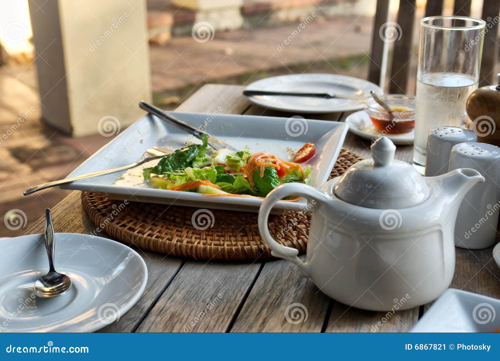 Closeup of Salad Dish N Tea Pot in Restaurant Stock Image - Image of ...