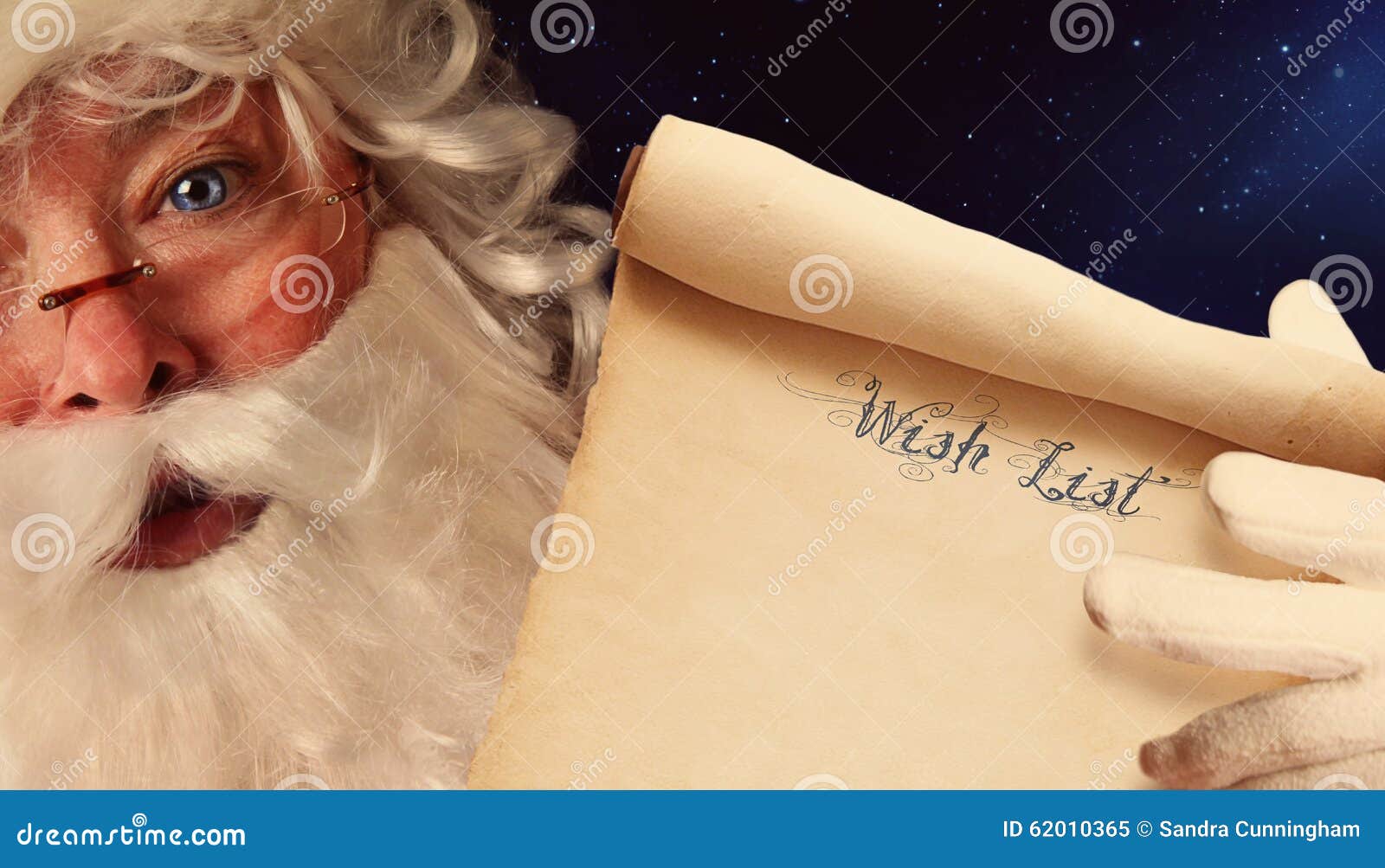 Closeup of Santa Clause Holding Scroll Stock Image - Image of advert ...