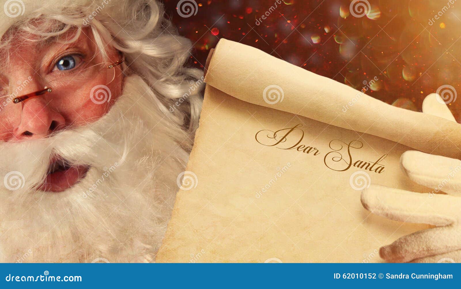 Closeup of Santa Holding a Dear Santa Scroll Stock Photo - Image of ...