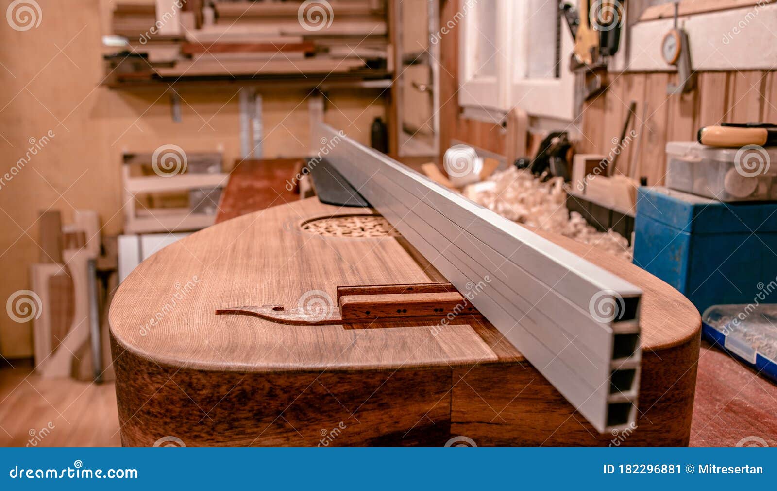 Closeup Scene of a Precision Process for Building a Stringed Musical ...