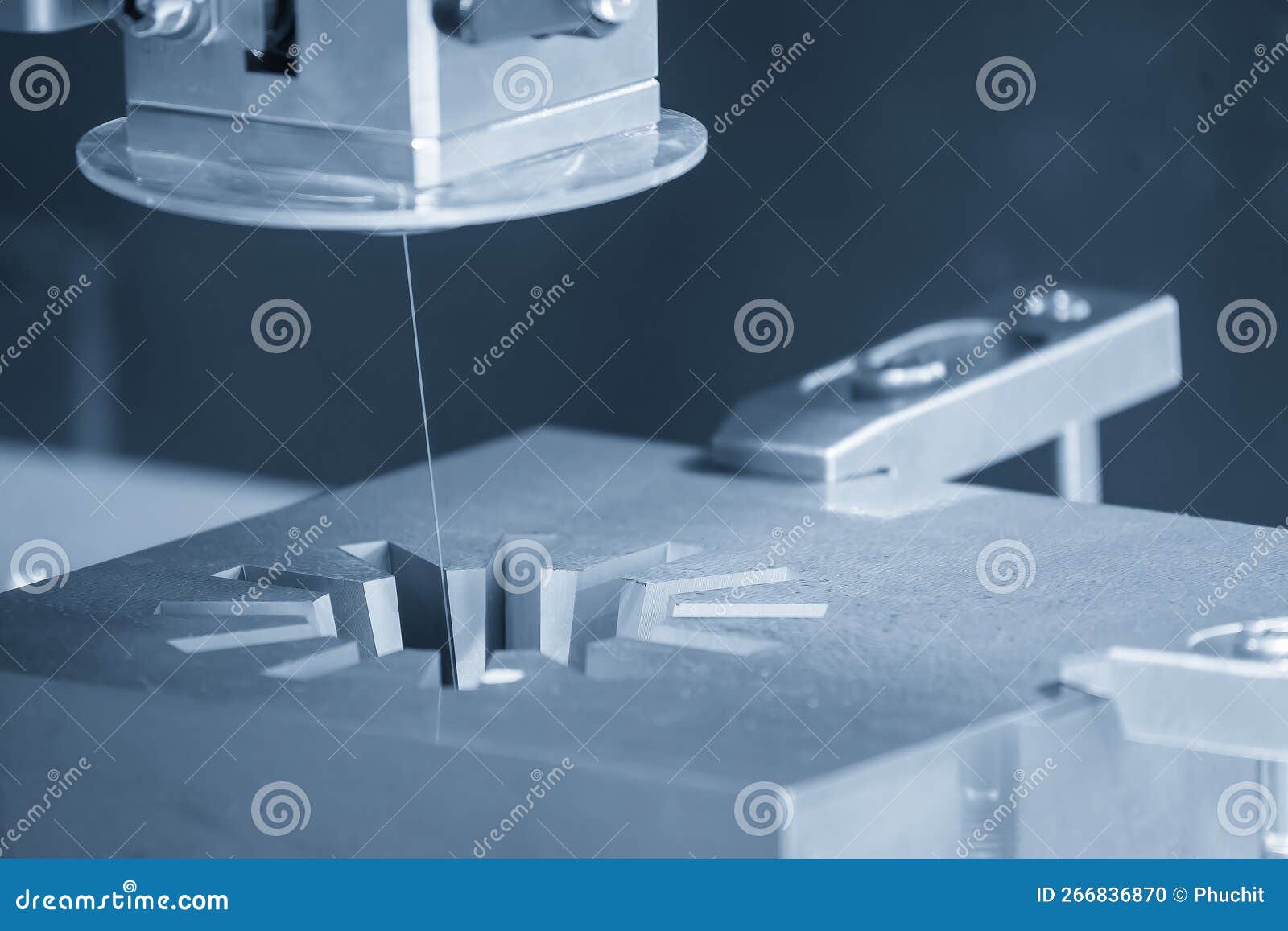 Closeup Scene the Wire EDM Machine Cutting the Mold Insert Parts Stock ...
