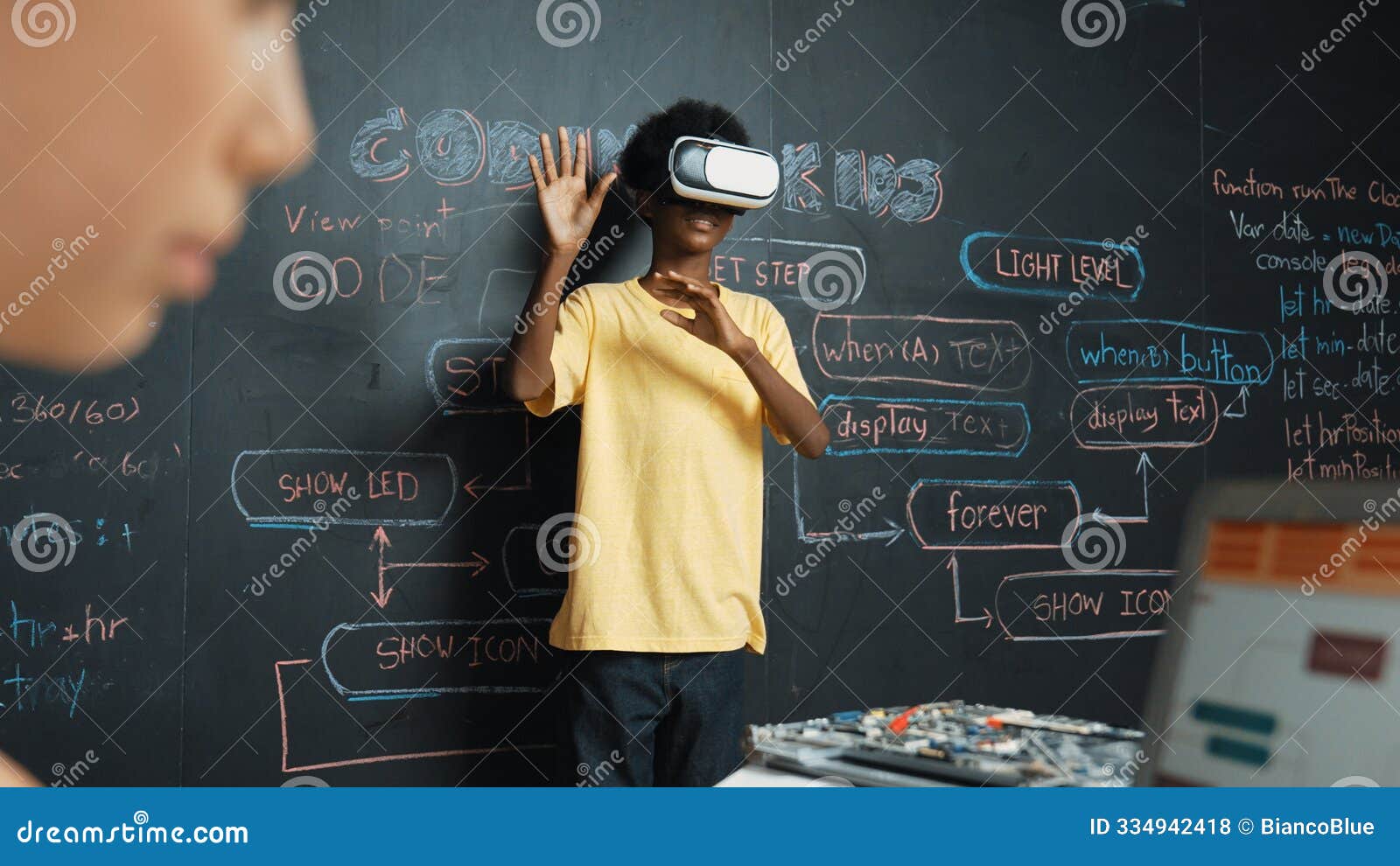 Closeup of School Girl Hand Coding Program while Student Using VR ...