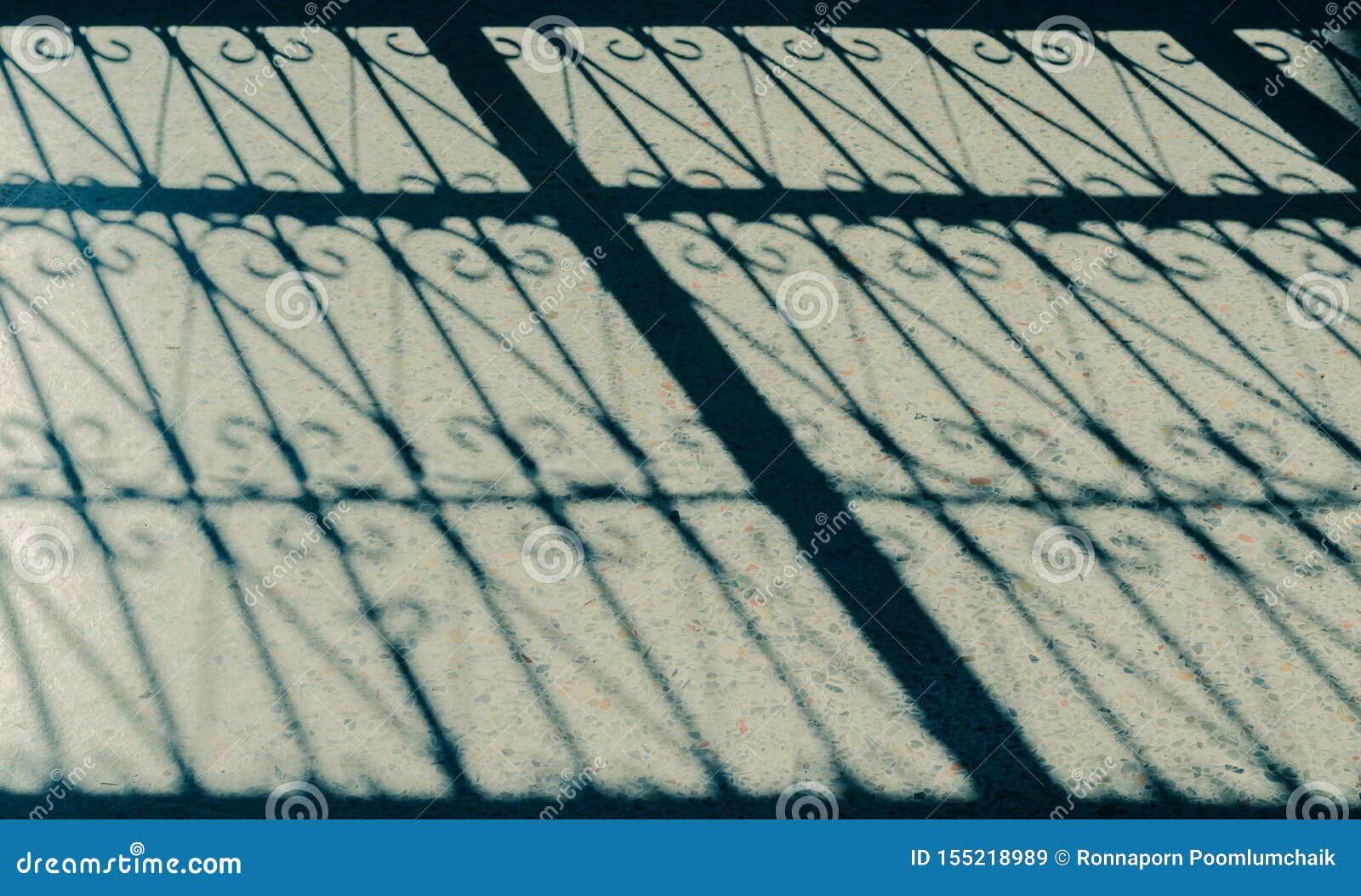 A Closeup Section Metal Fence Shadow on the Sidewalk Stock Image ...
