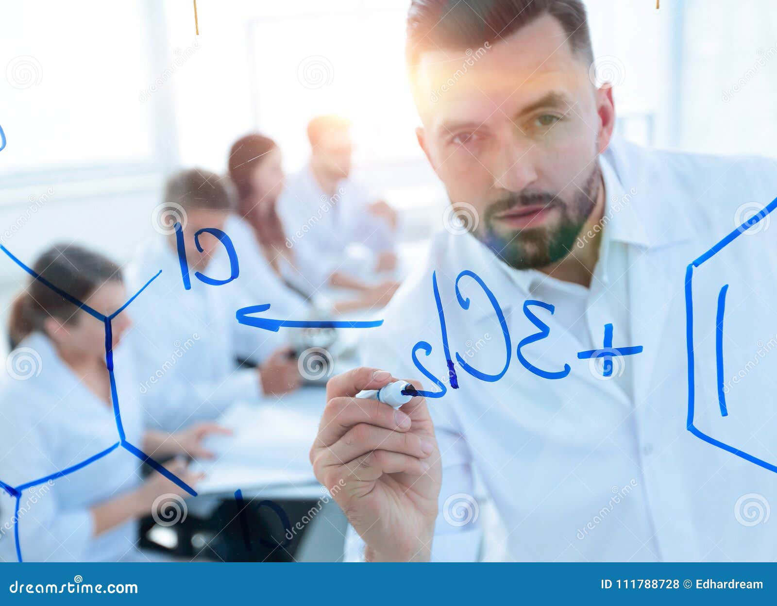 Closeup of a Serious Scientist Working with Formulas Stock Photo ...